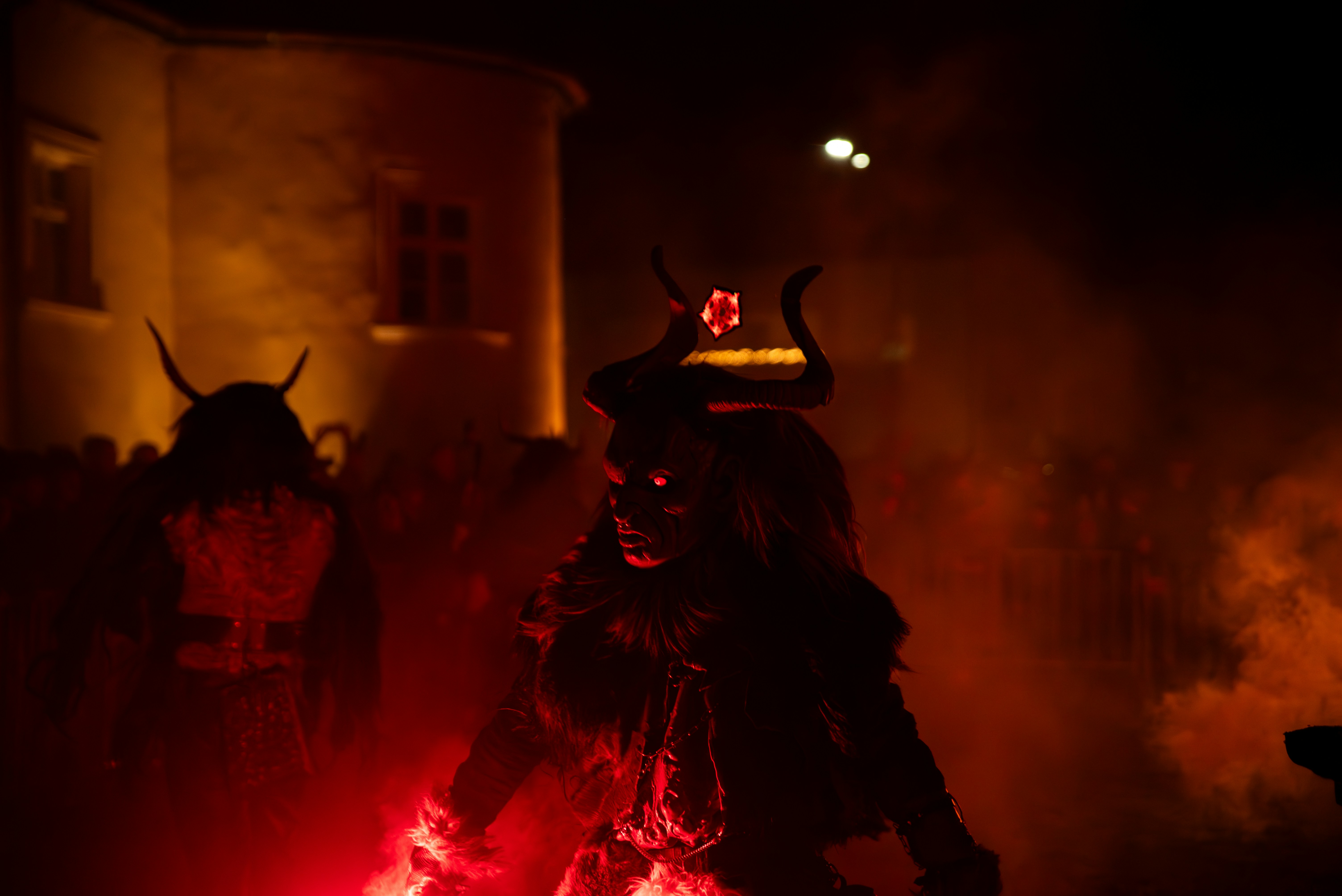 Hooded Firebringer at Dusk: A Ritual in Red Mist