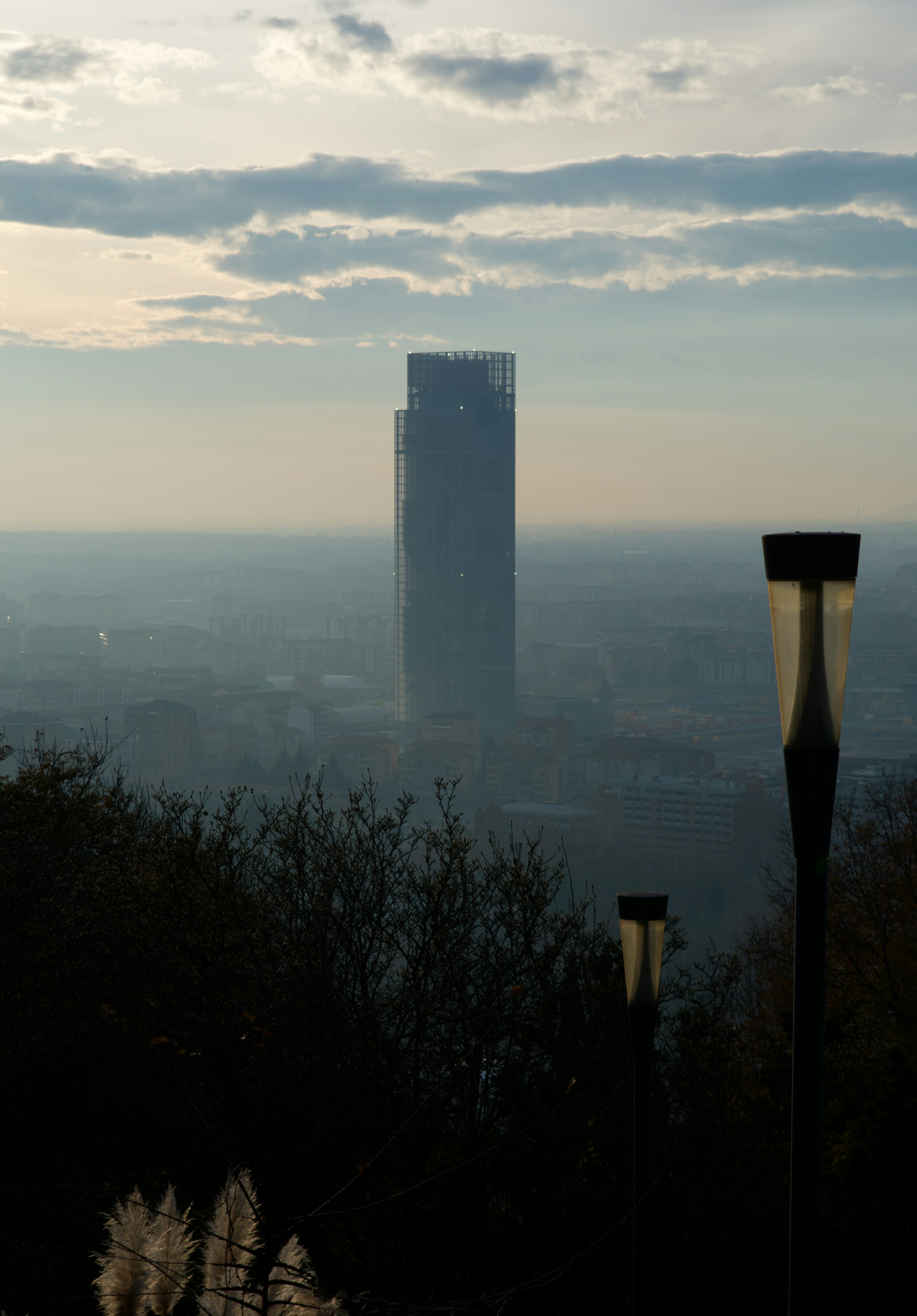 City Tower Pierced by Dusk: A Quiet Horizon from the Park