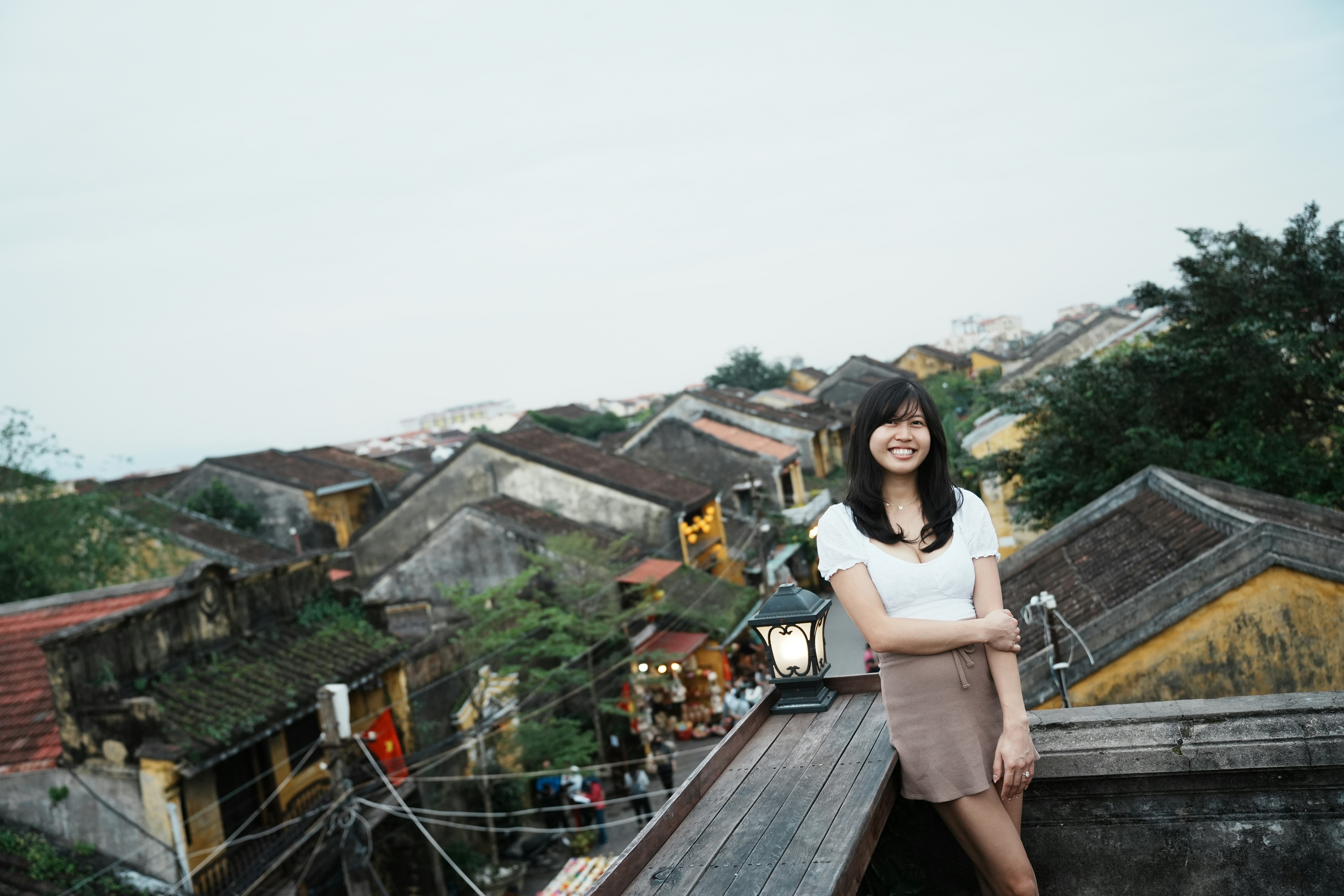 City Terrace Portrait: A Smile Amid Sloped Rooftops