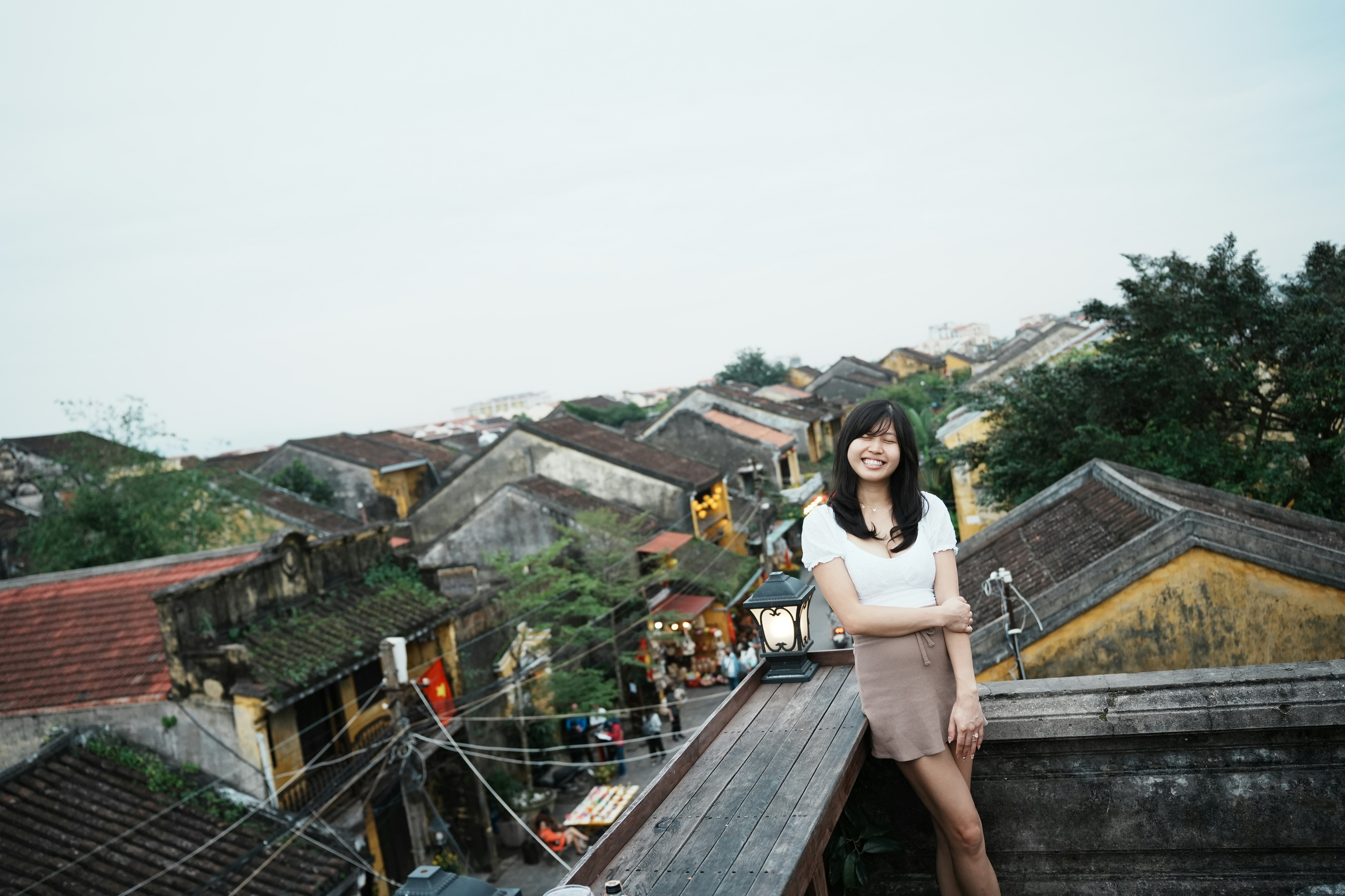Rooftop Vista: A Quiet Moment Above a Colorful Vietnamese Daintown