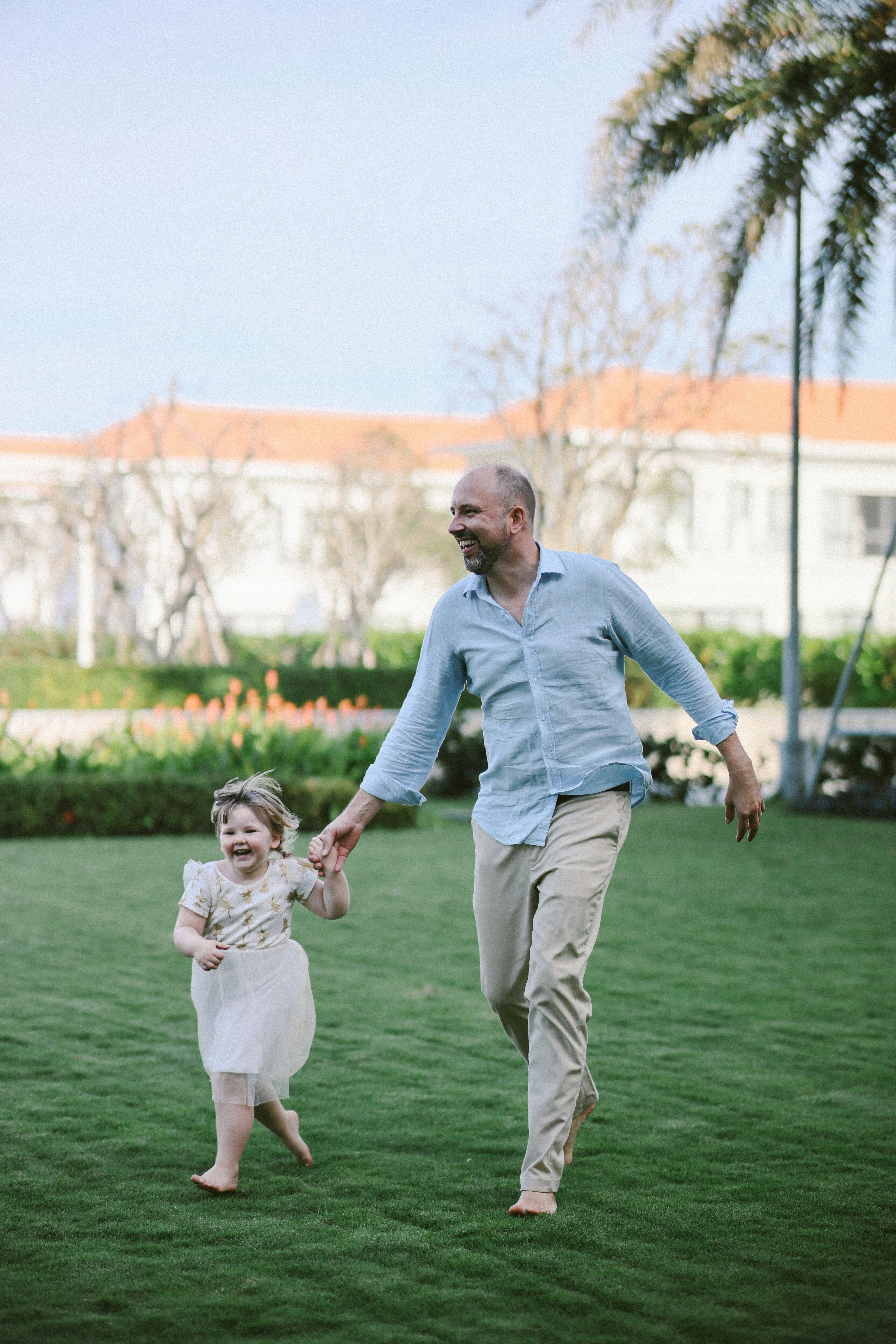 Holding Hands, Running Hearts: A Father and Daughter Share a Garden Escape
