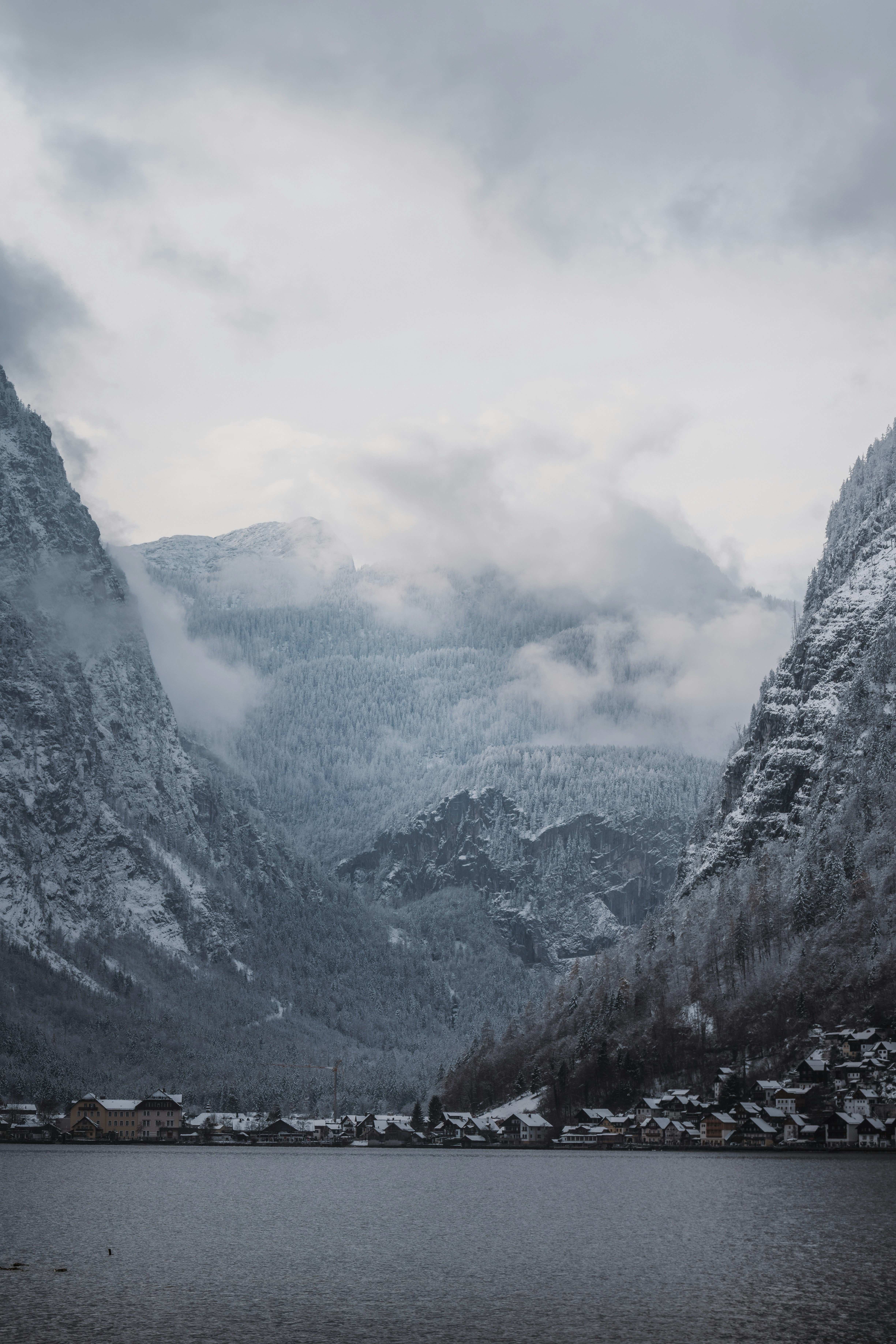 Snowbound Fjord Village Nestled Between Steep Peaks