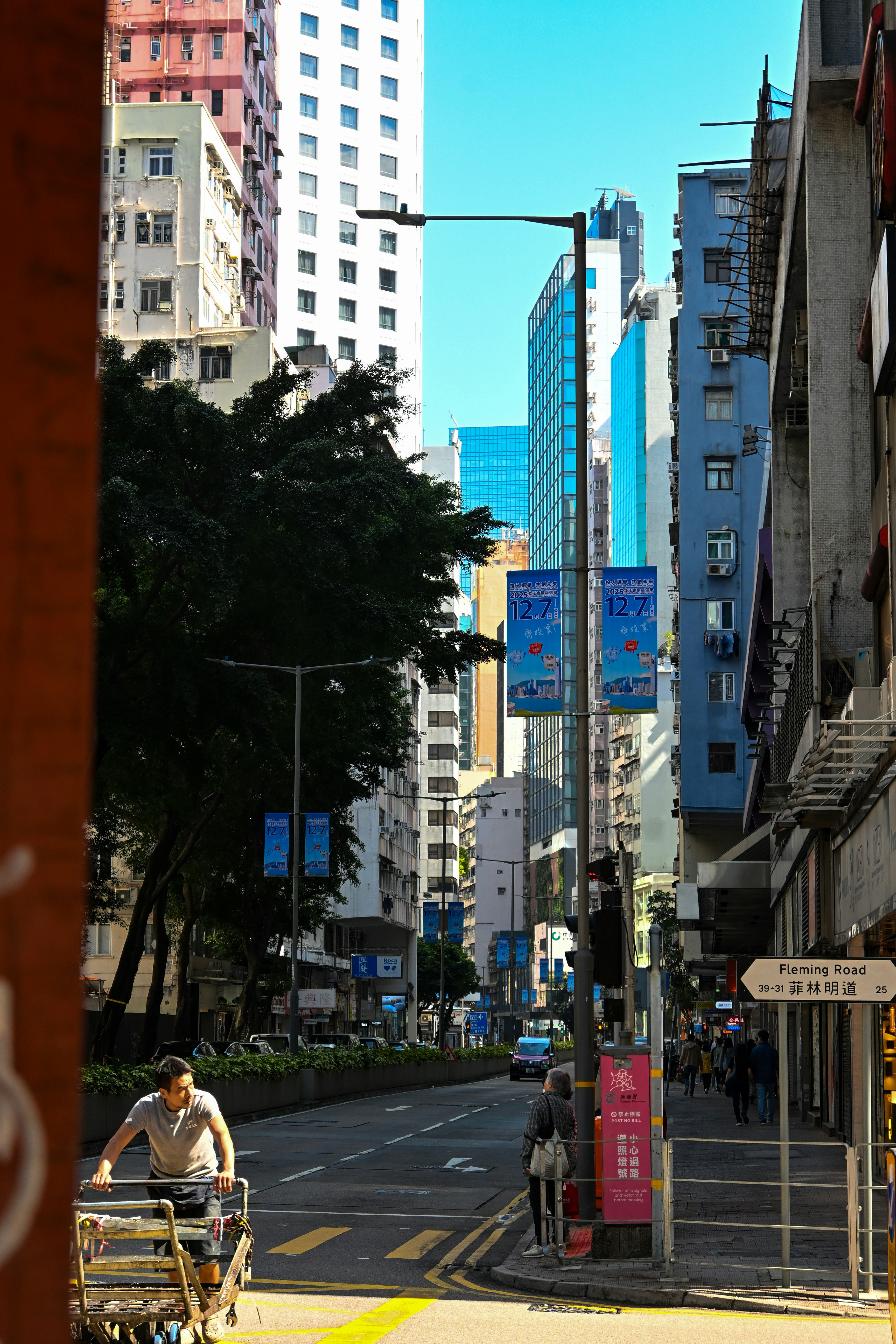 Urban Corridor: Afternoon Traffic, Shadows and Skyline