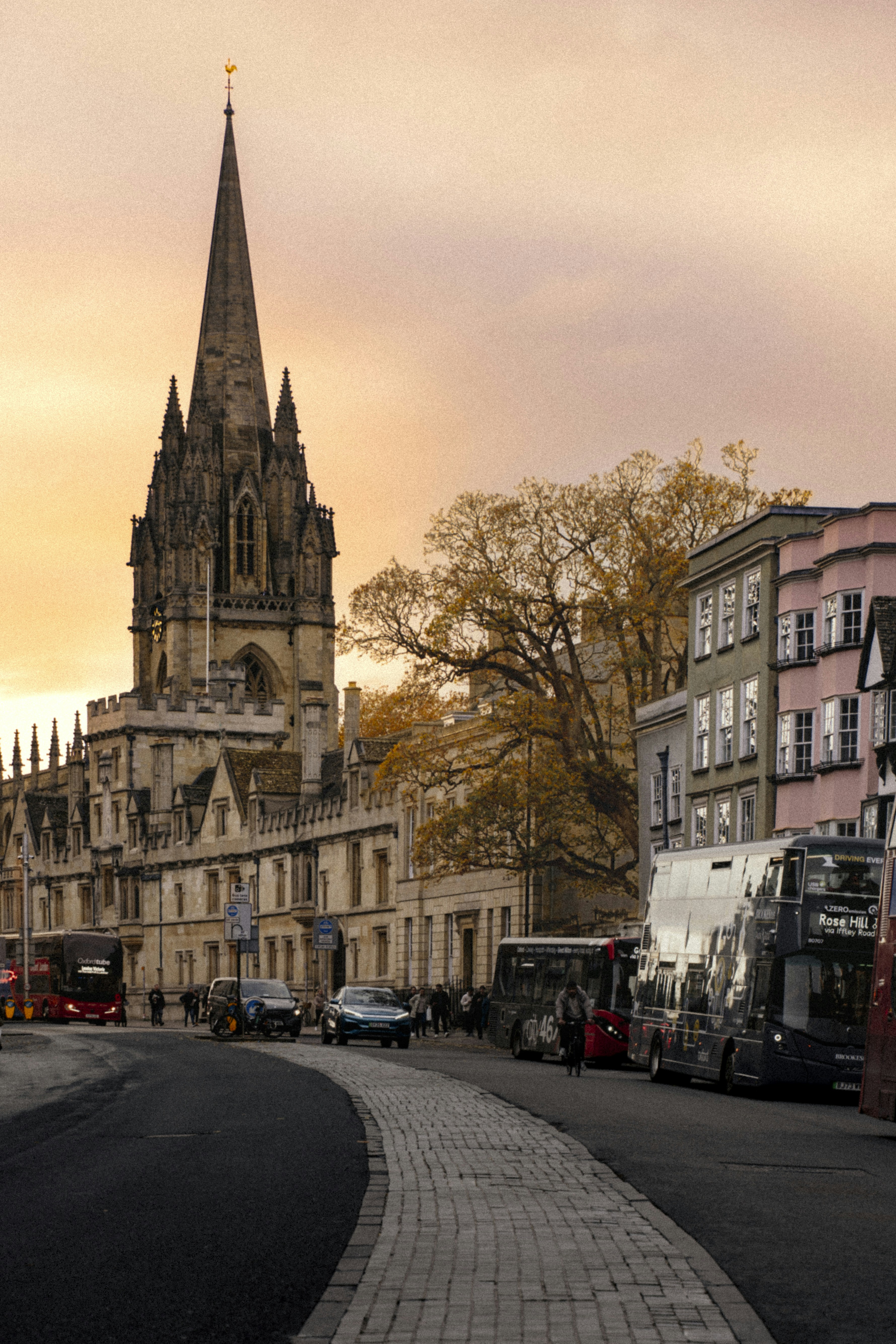 Gothic Spire Over Orange Evening: A Street Scene in Wiltshire Hue