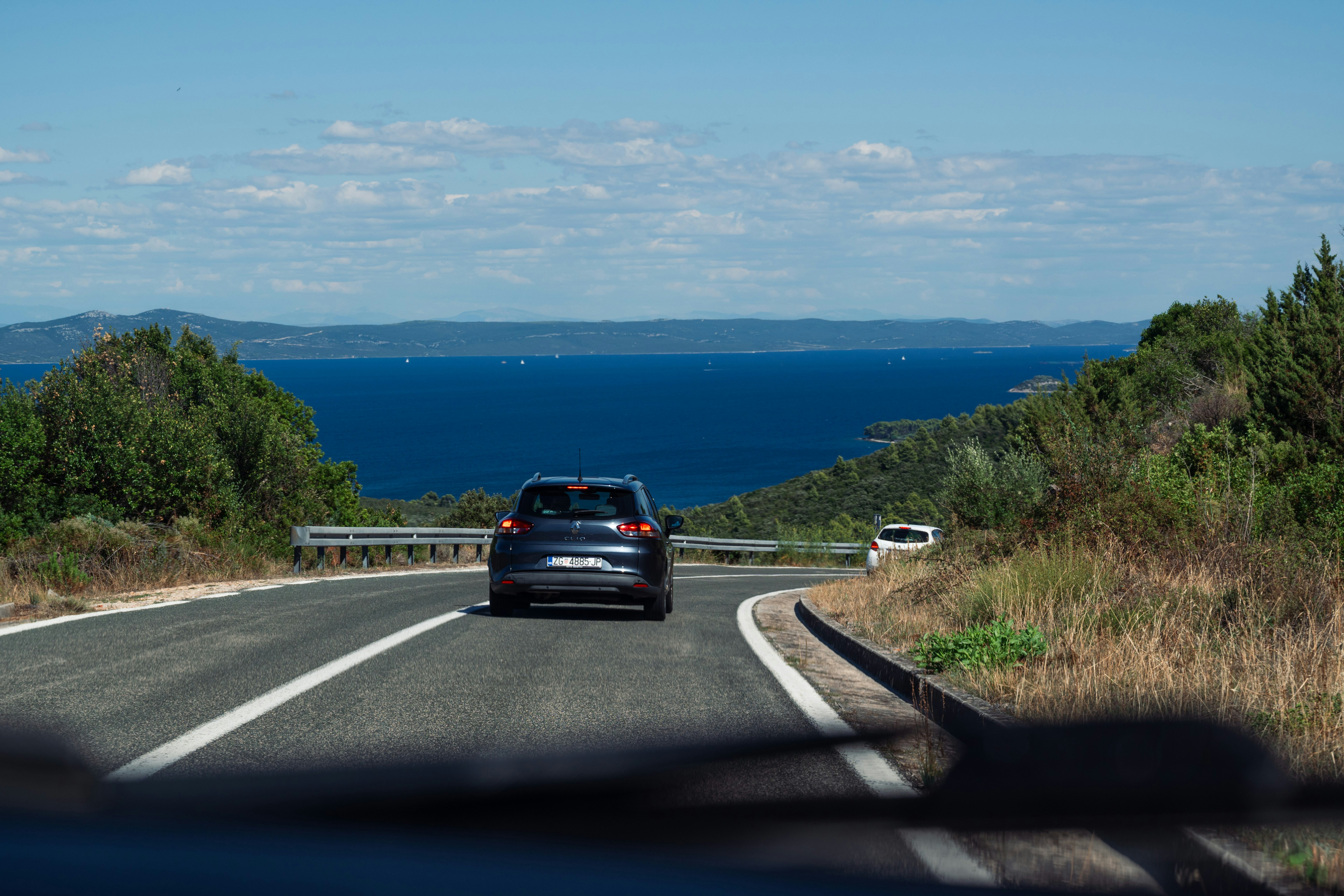 Horizon Highway: Blue Sea, Moving Cars, and the TV Distance