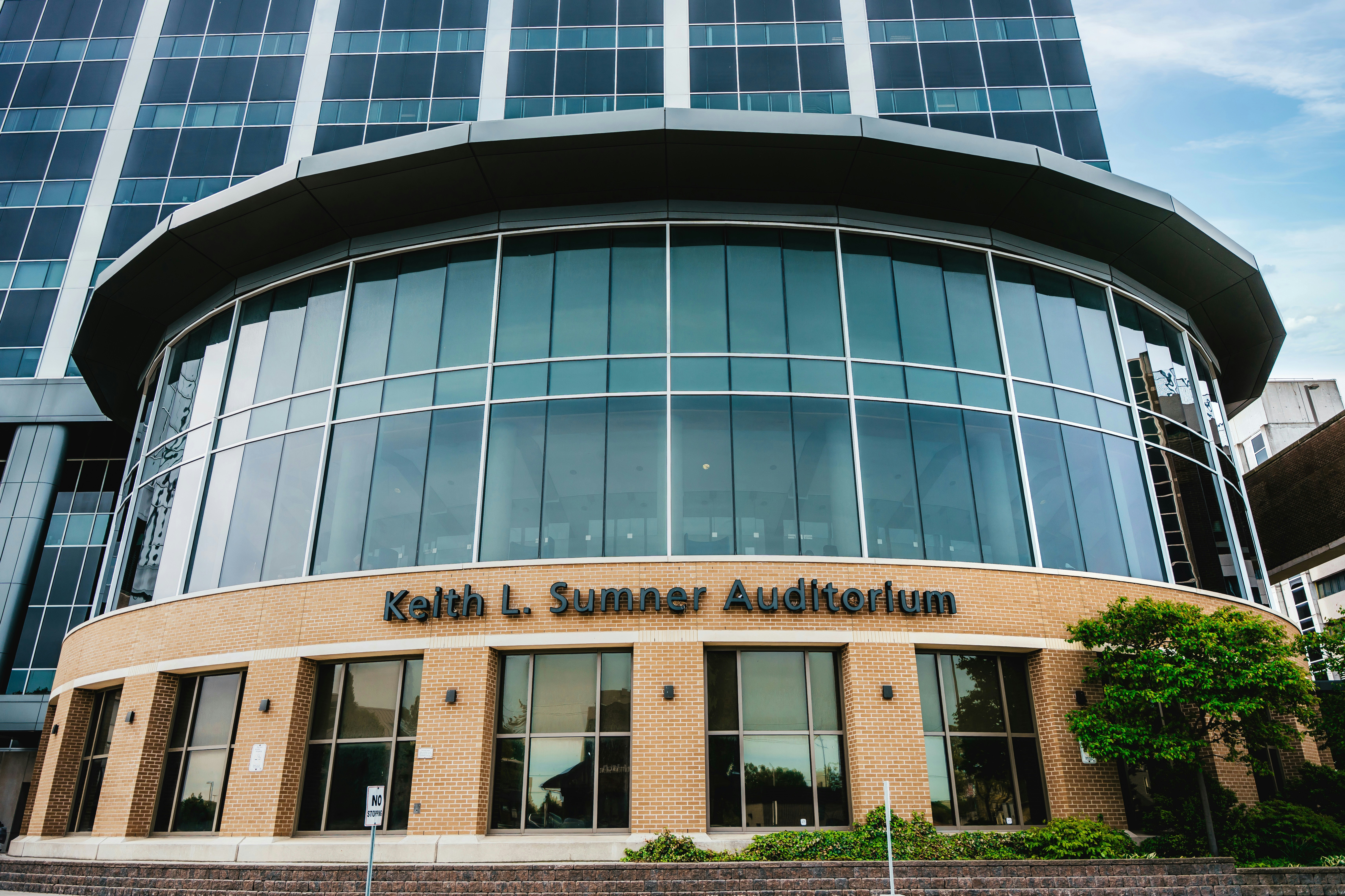 Modern building with keith l. sumr auditorium signage