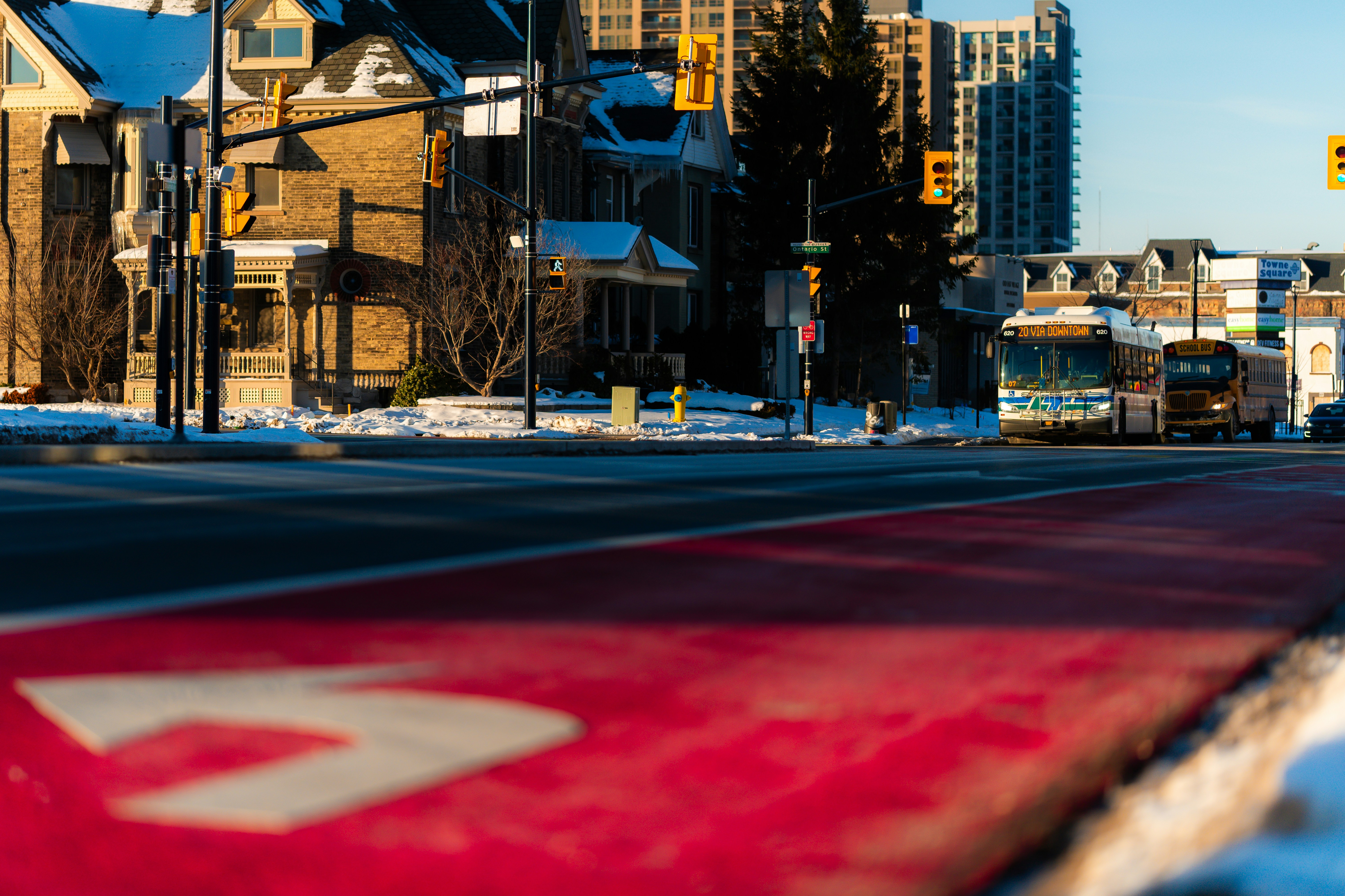 Edge of the Crosswalk: Urban Streetcar in Winter Light