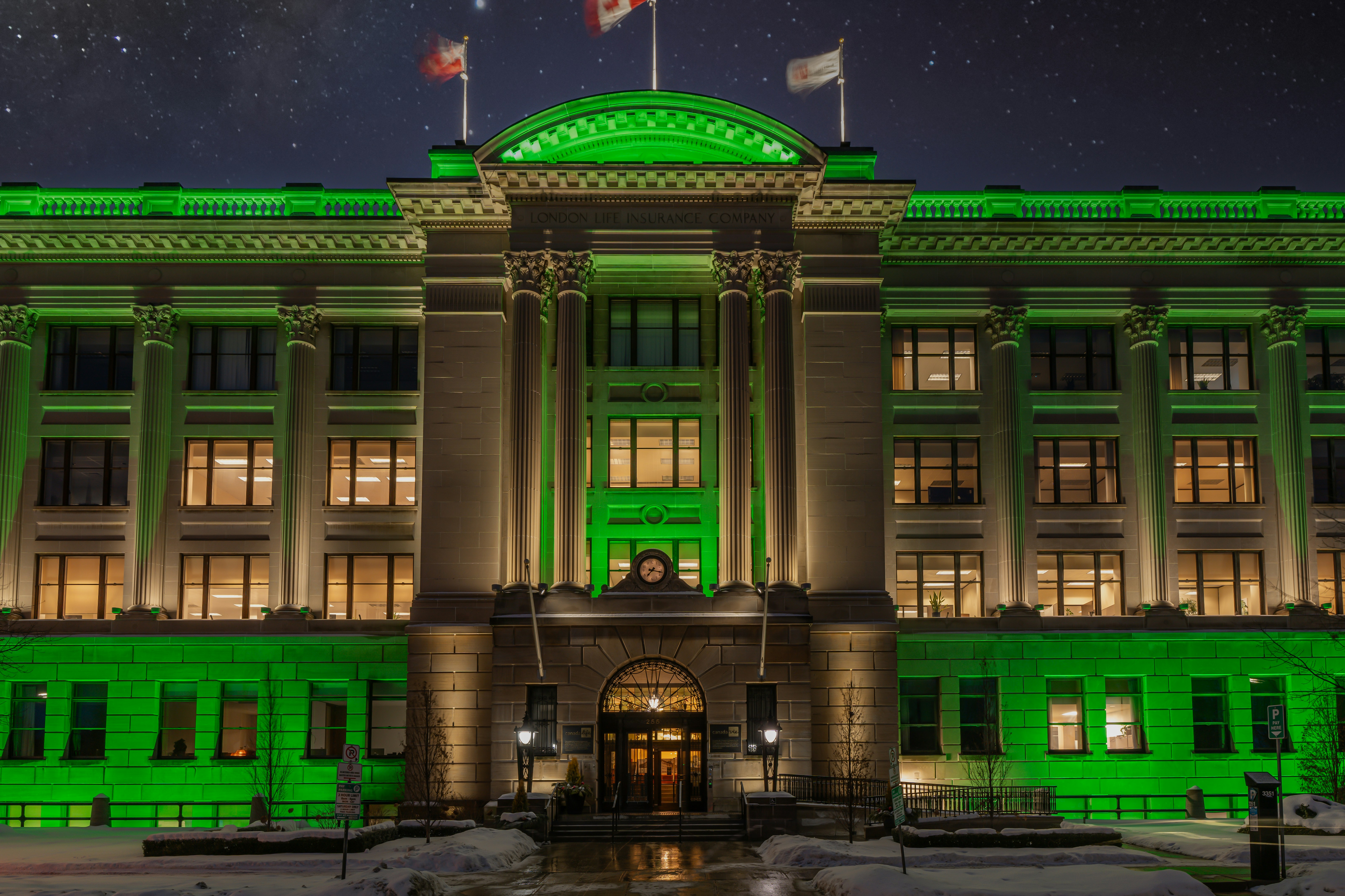 Emerald Facade Under Night Sky