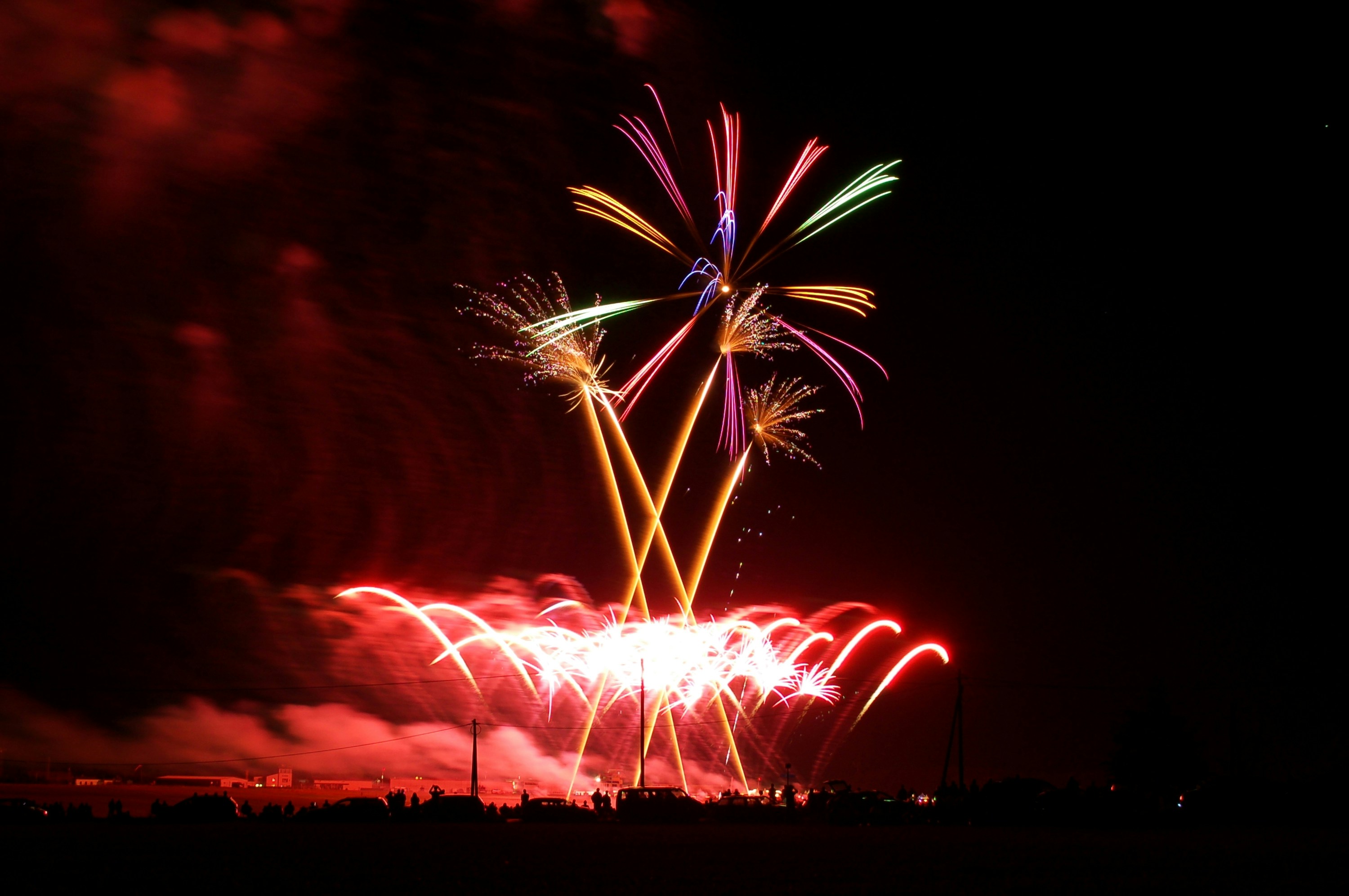 Nightsky Cathedral: Fireworks Eruption Above a Dark Horizon