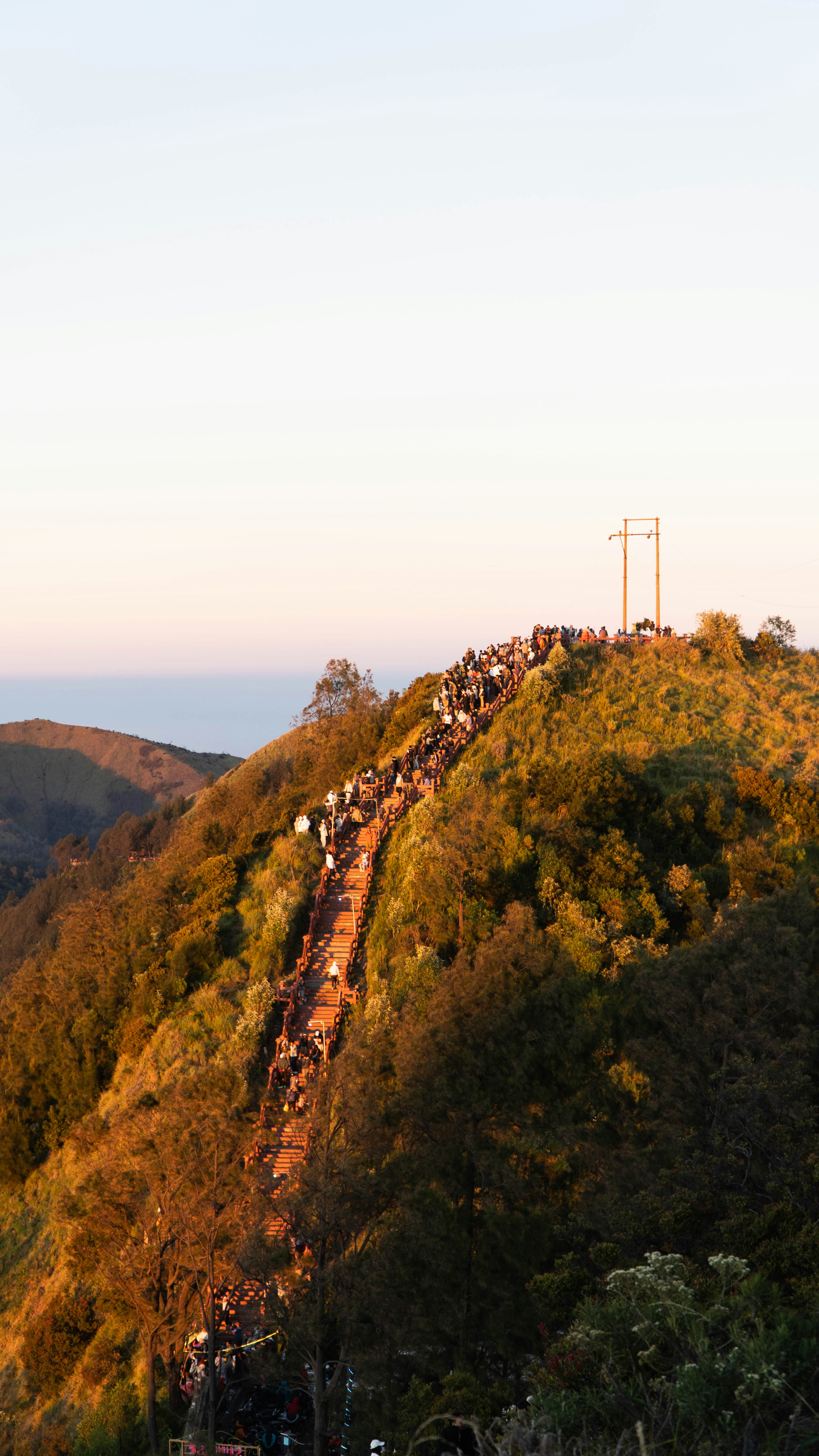 Ridge of Ascension: A Line of Onlookers Climbing the Sunset Trail
