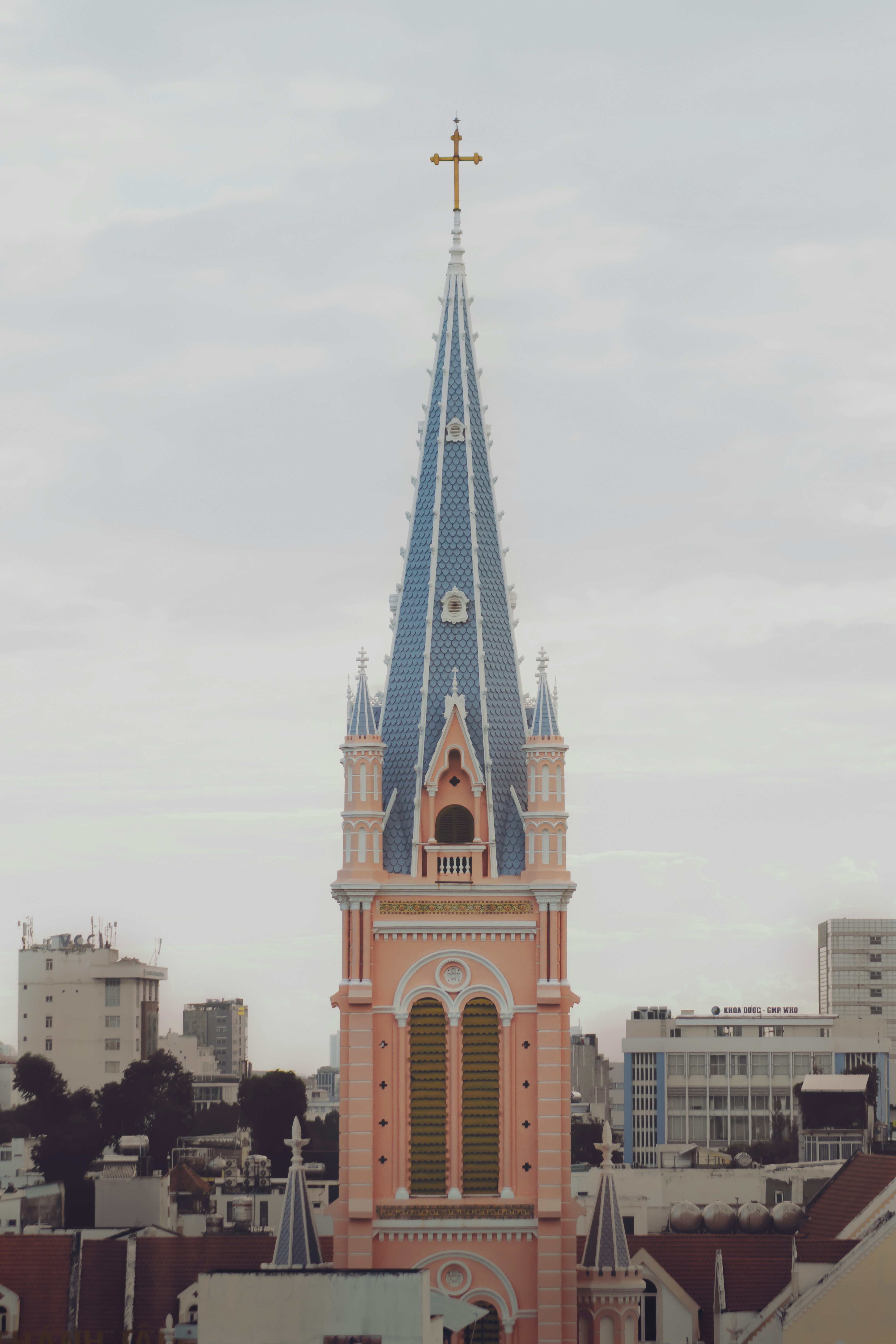 Spire of Serenity: A Peach Church Tower Reaching Toward the Sky