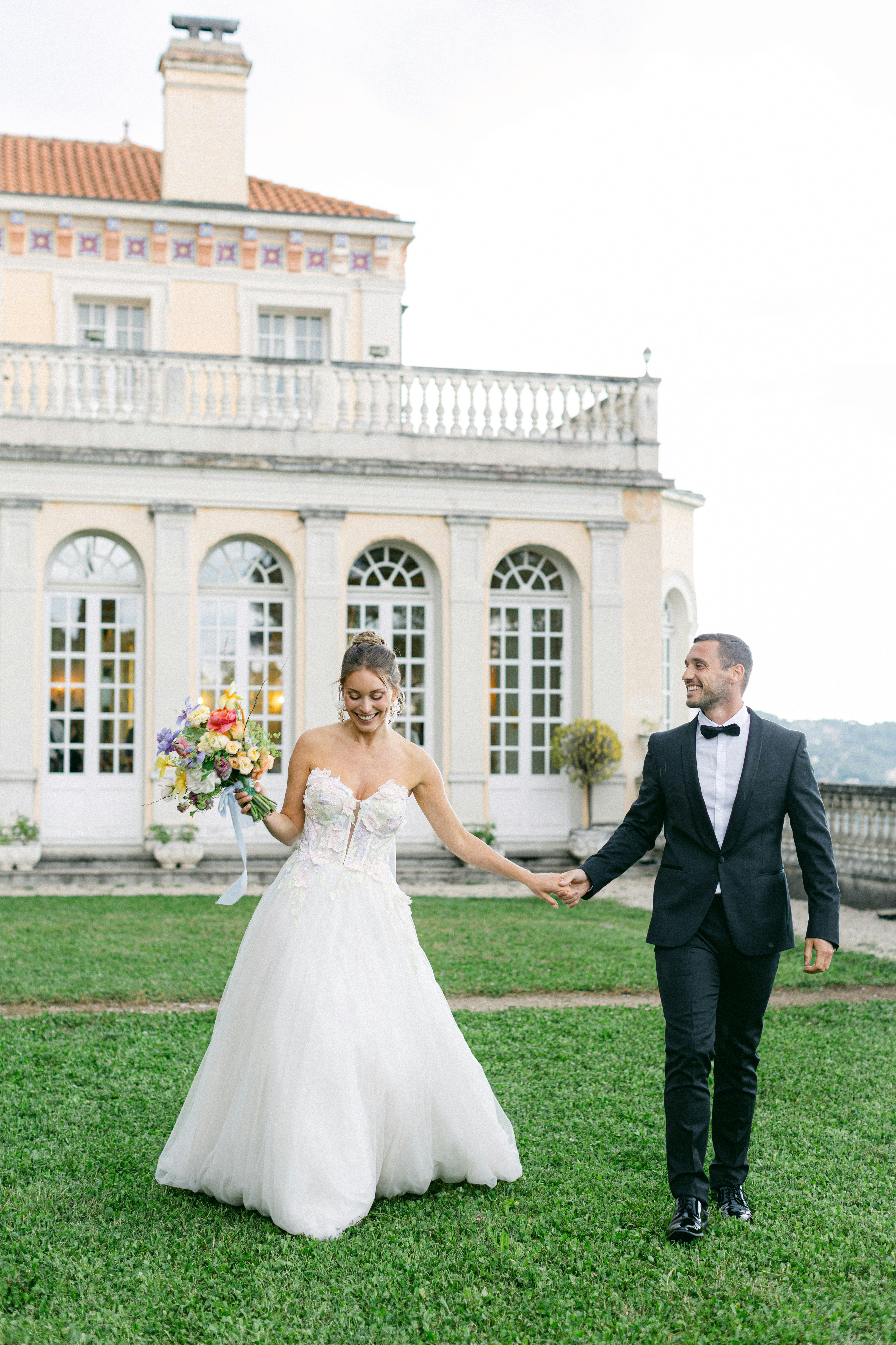 Holding Hands on a Sunlit Estate