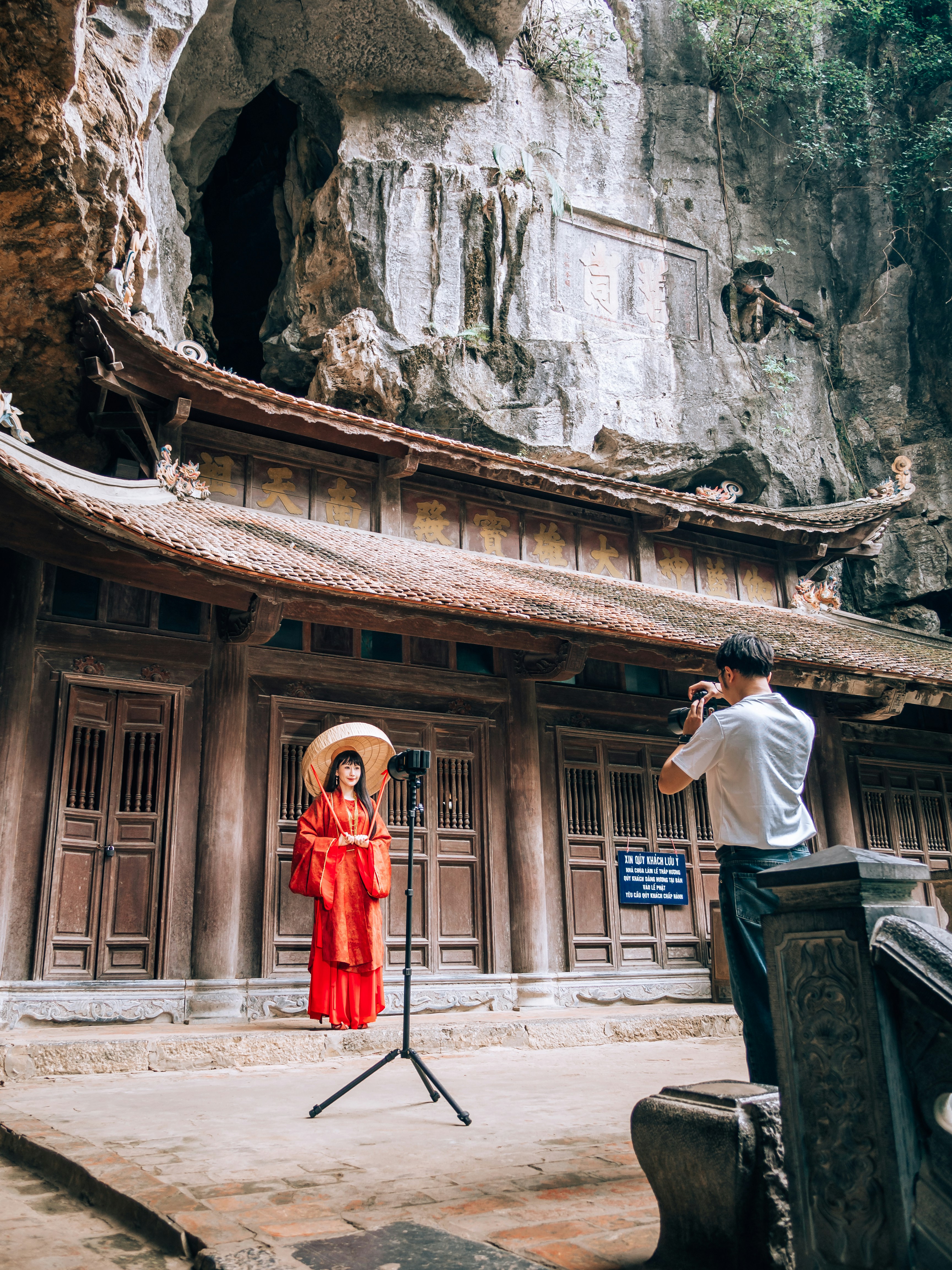 Red Robe in the Cavelight: Portraits Before a Ancient Cliff