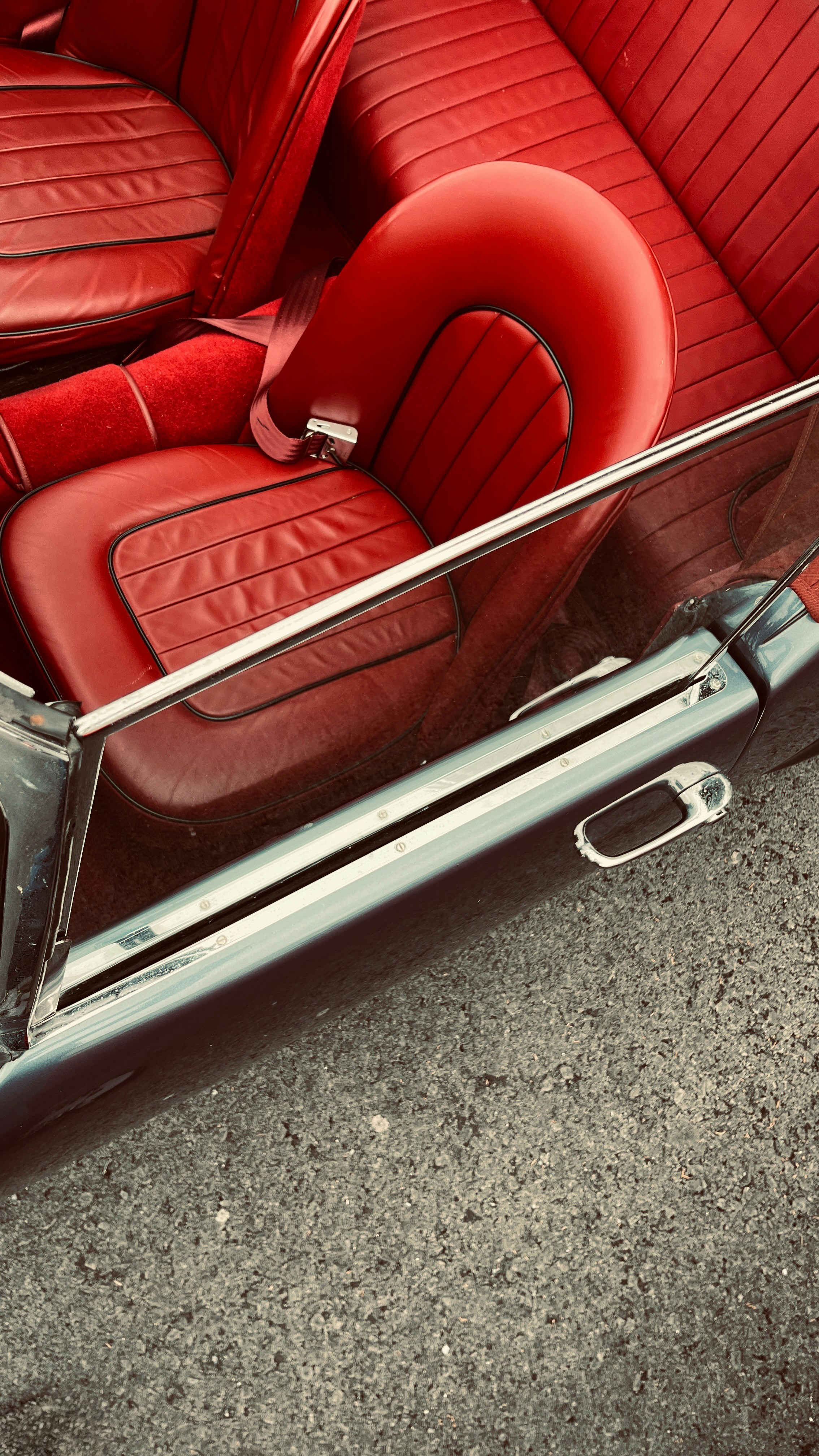 Crimson Car Interior: Echoes of a Classic Ride