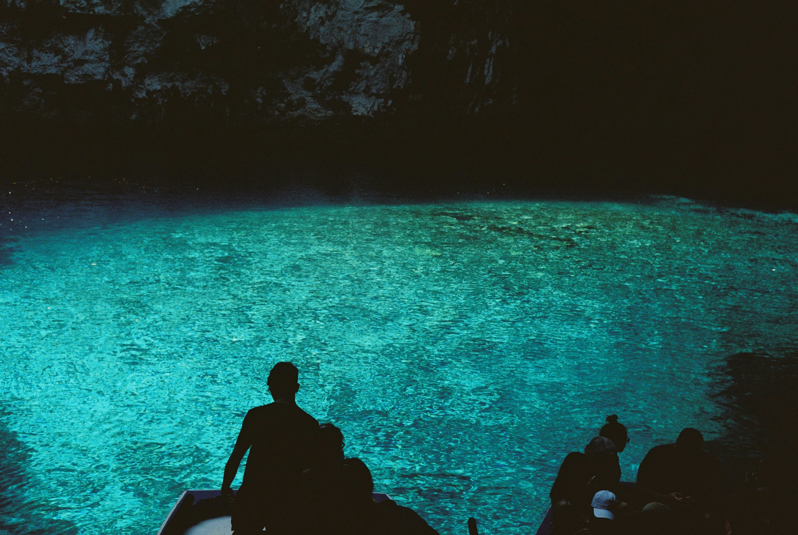 People waiting for the boat in Melissani cave in Kefalonia, Greece