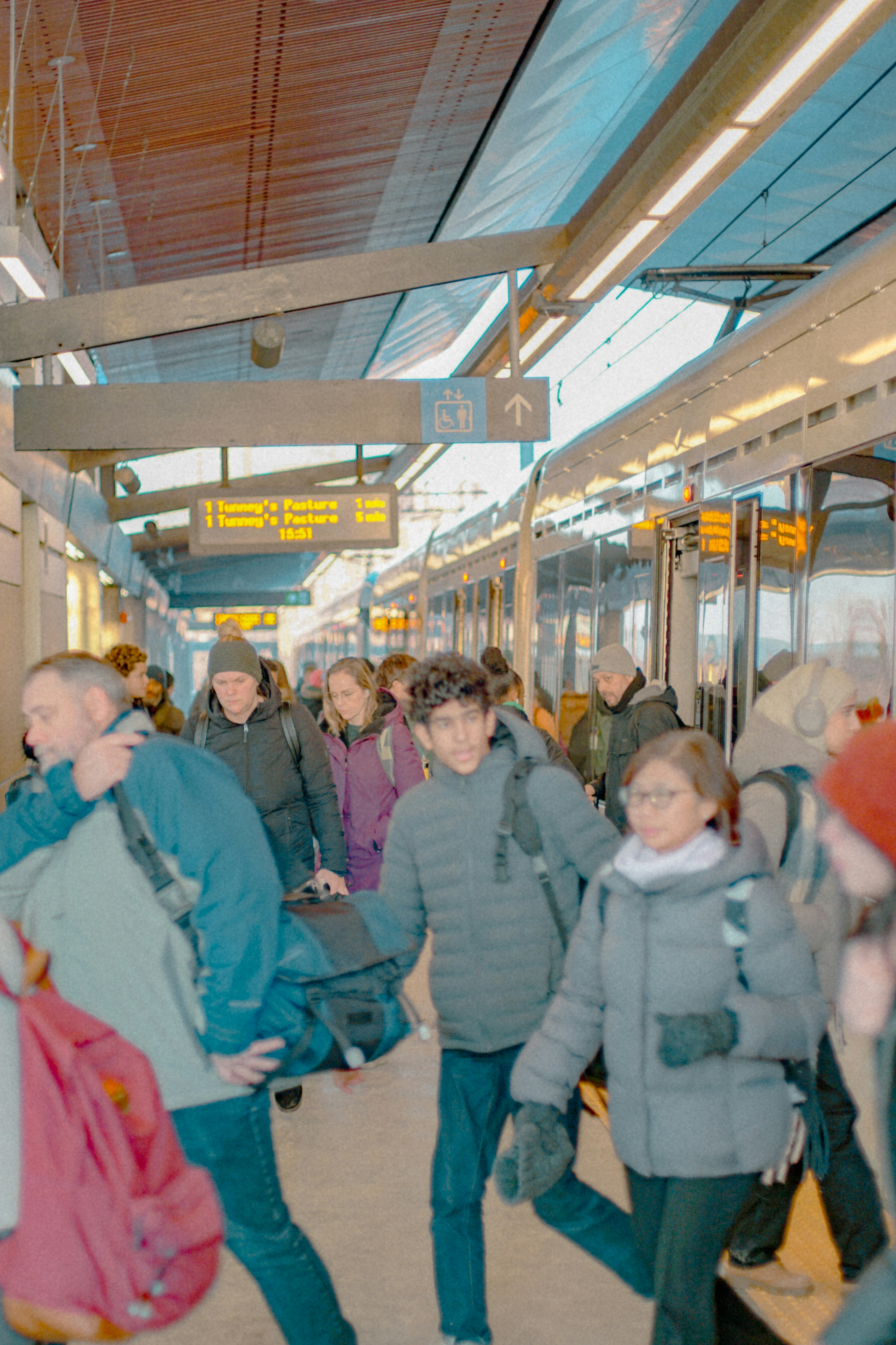 Crowded Platform Pulse: Commuters Move Through a City Transit Hub