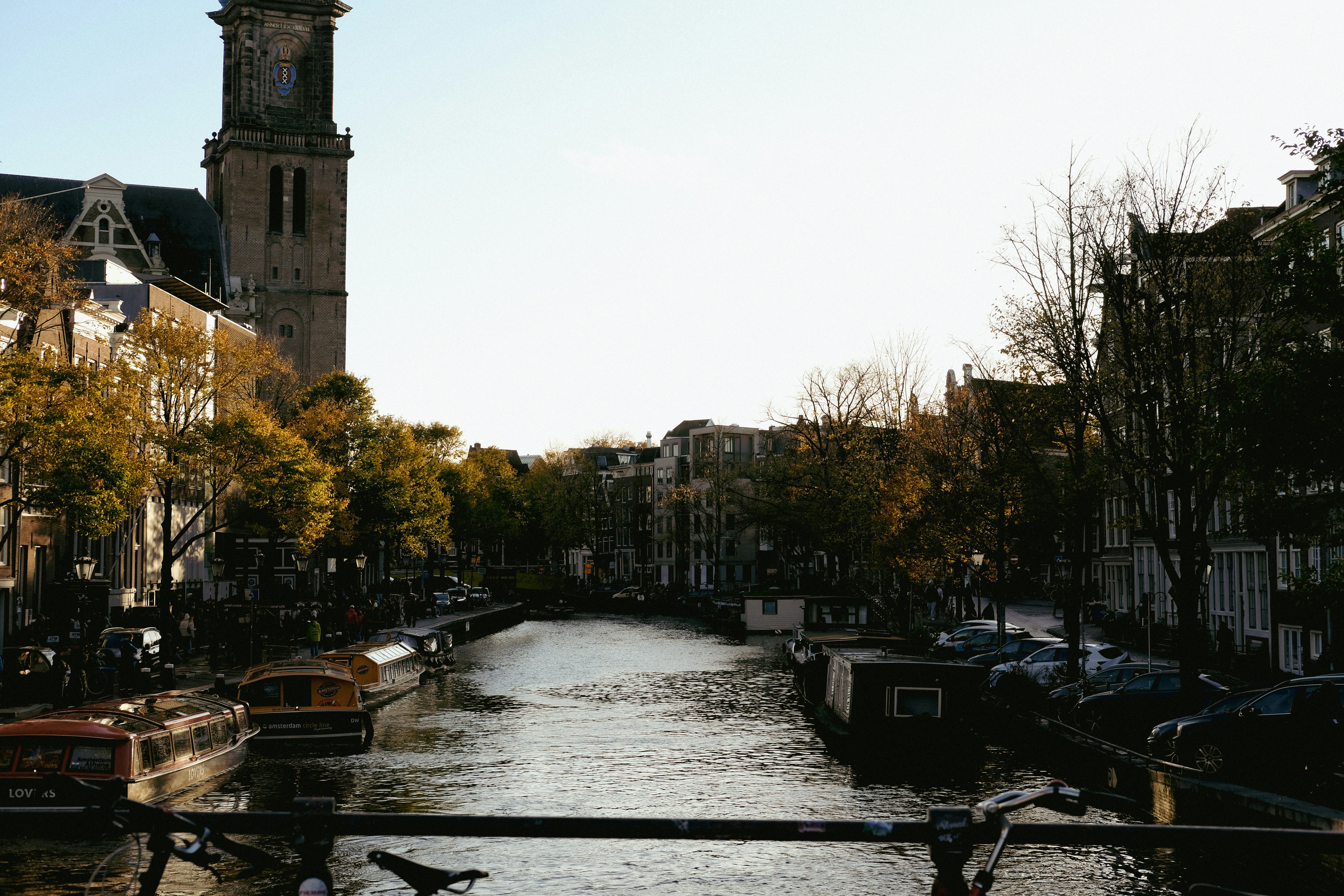 Toward the Clock Tower: Autumn Light on a Dutch Canal