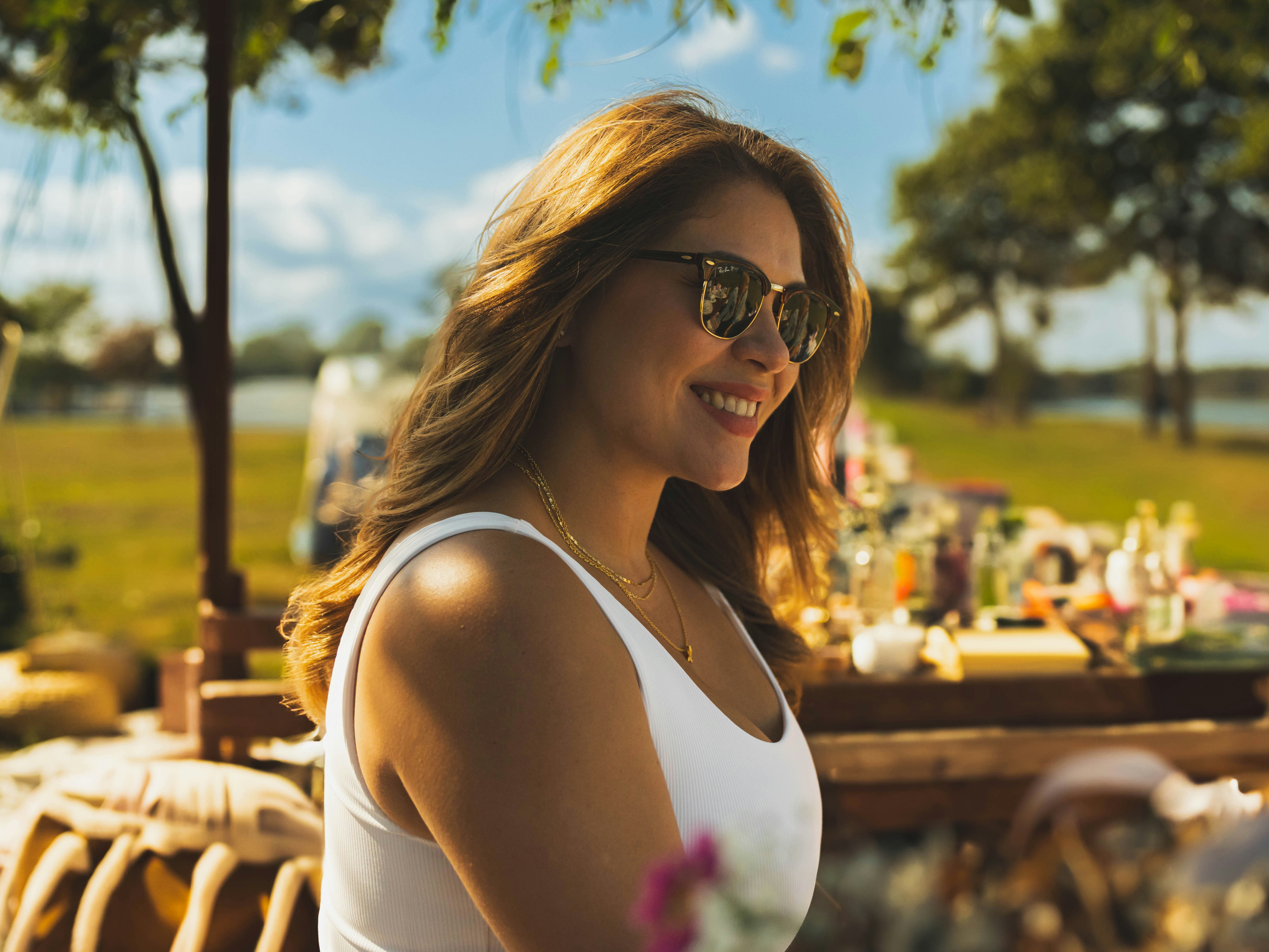 Sunlit Smile: A Portrait in Warm Park Light