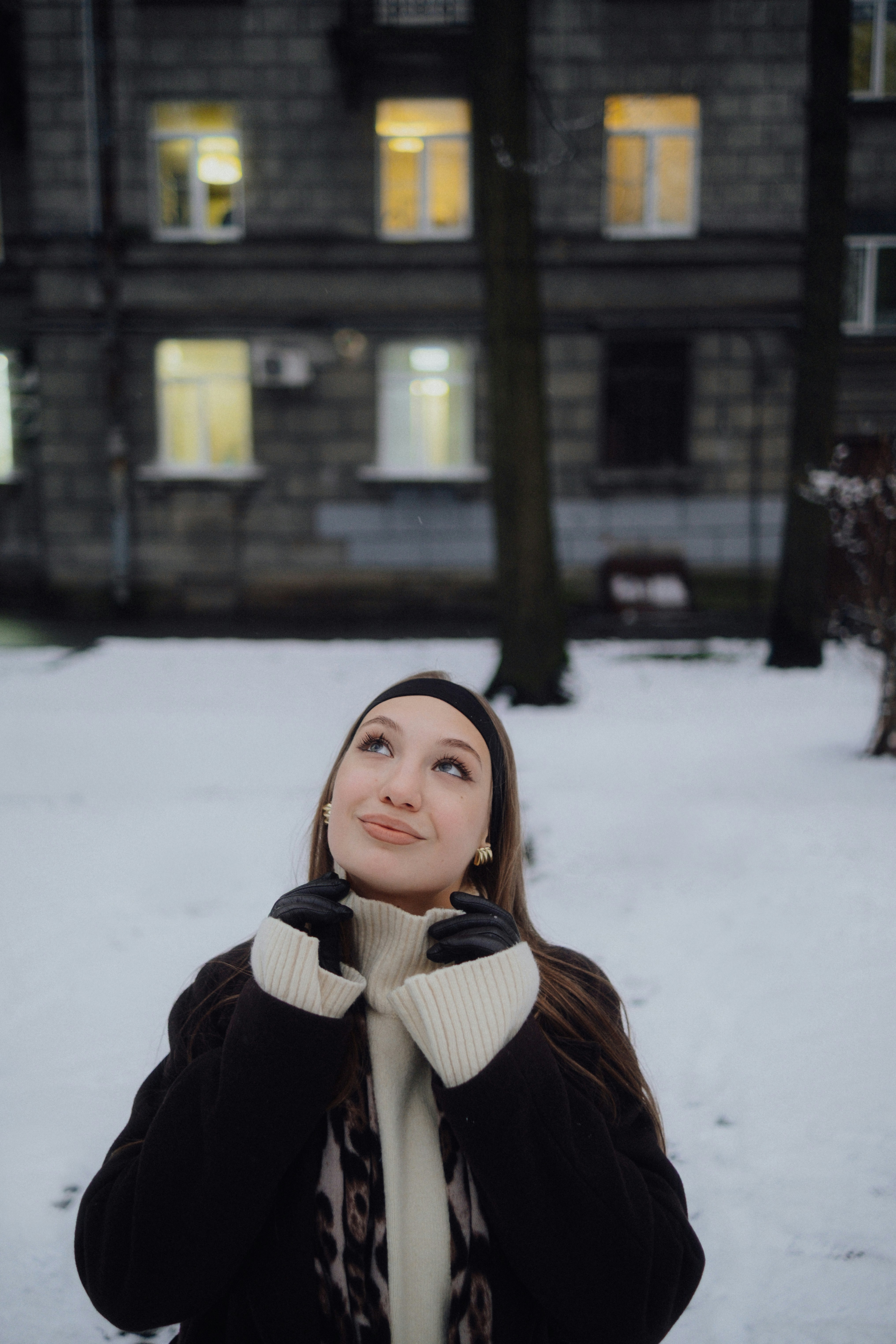 Winter Portrait Under Streetlamp Glow