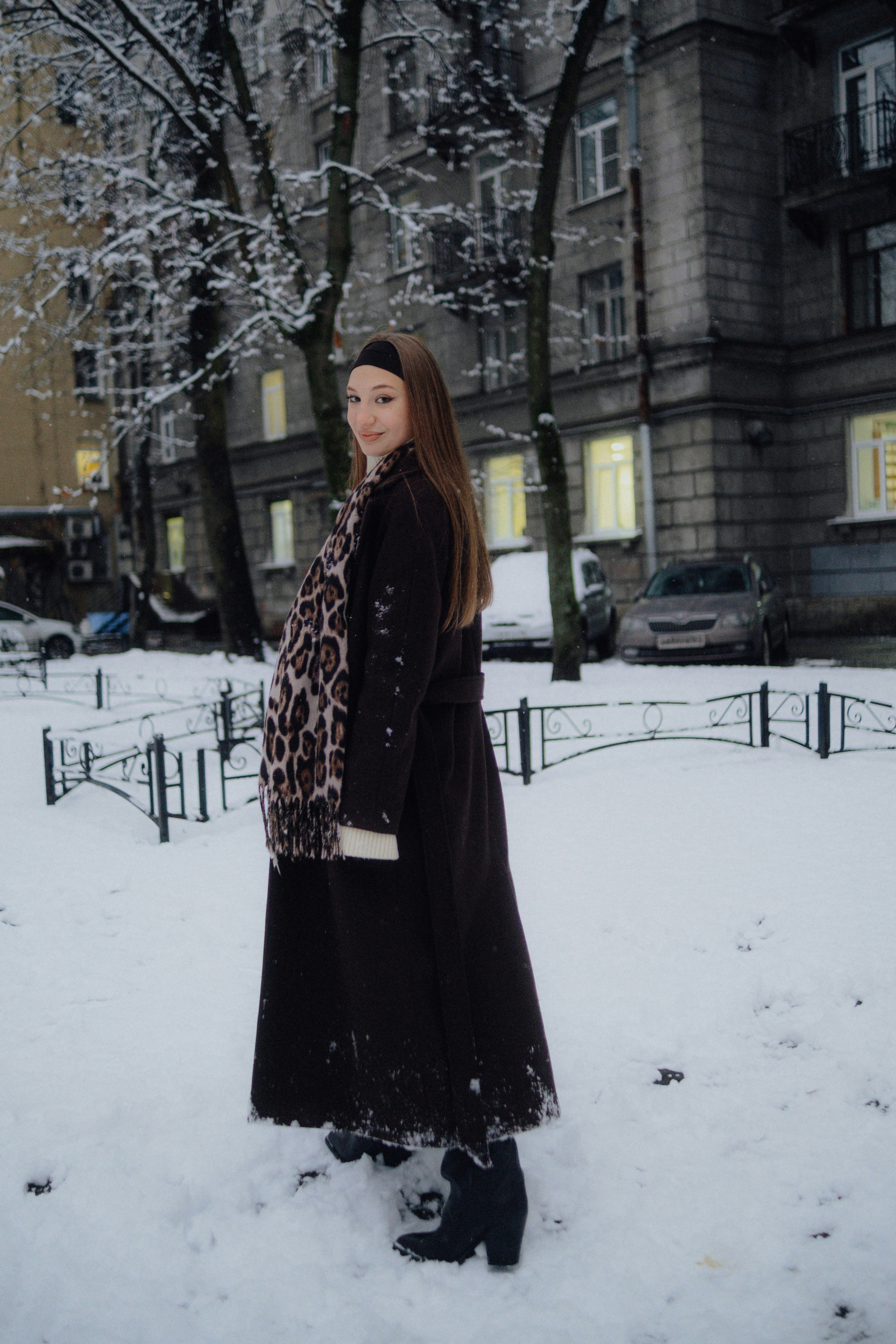 Winter Portrait Beneath Snow-Laden Branches