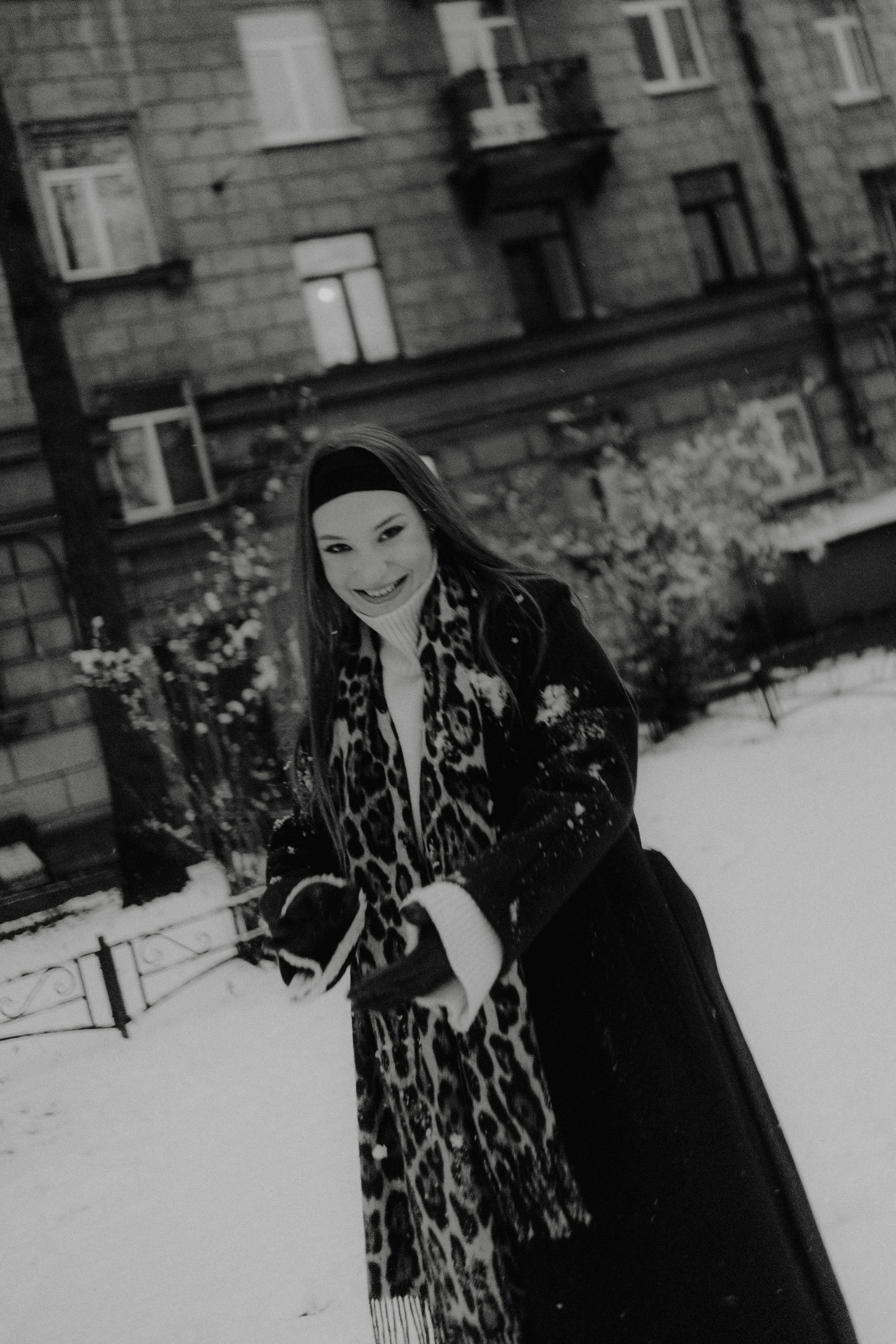 Snowy City Smile: A Portrait in Mono
