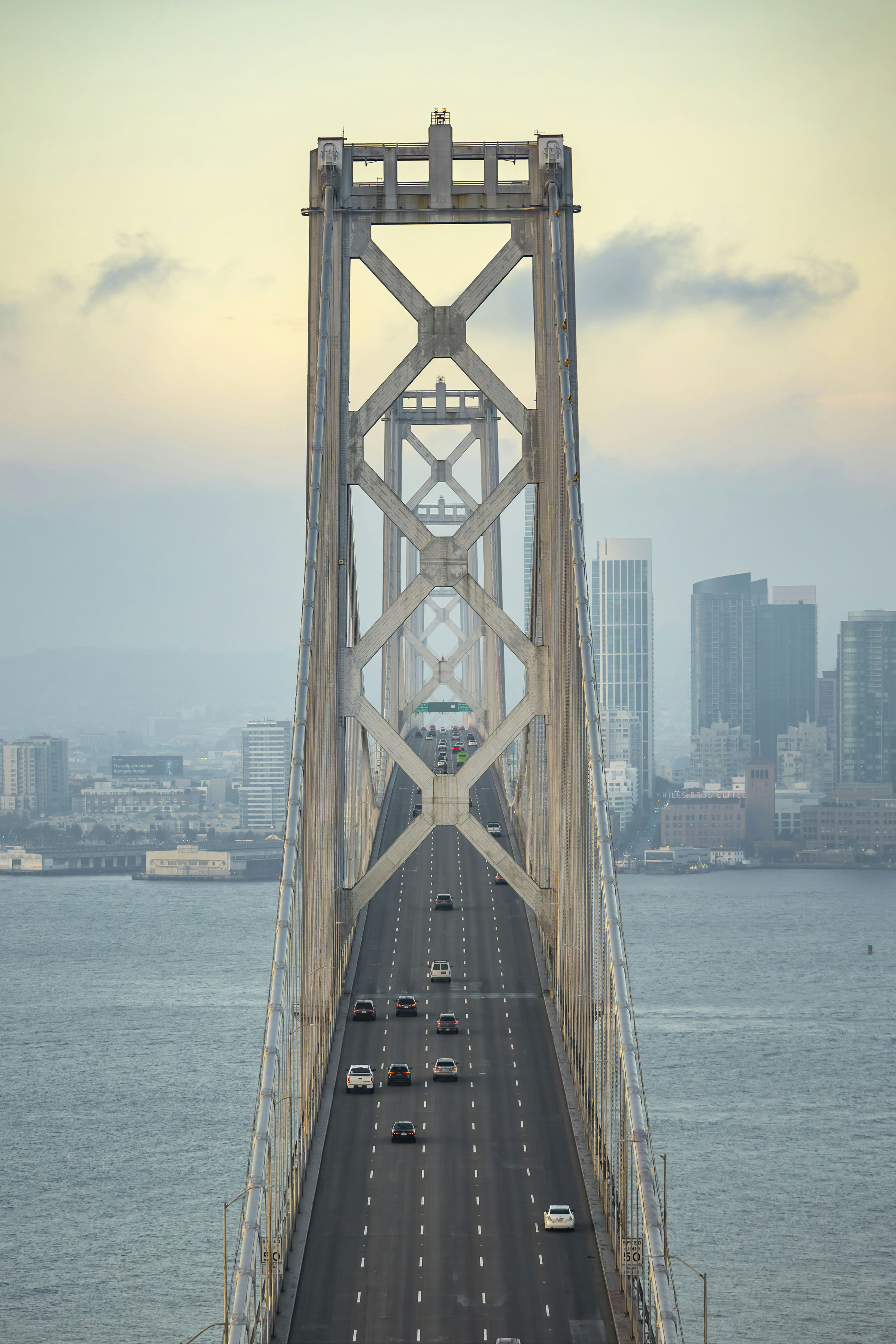 Ascendant Span: A Tolling Morning over the City