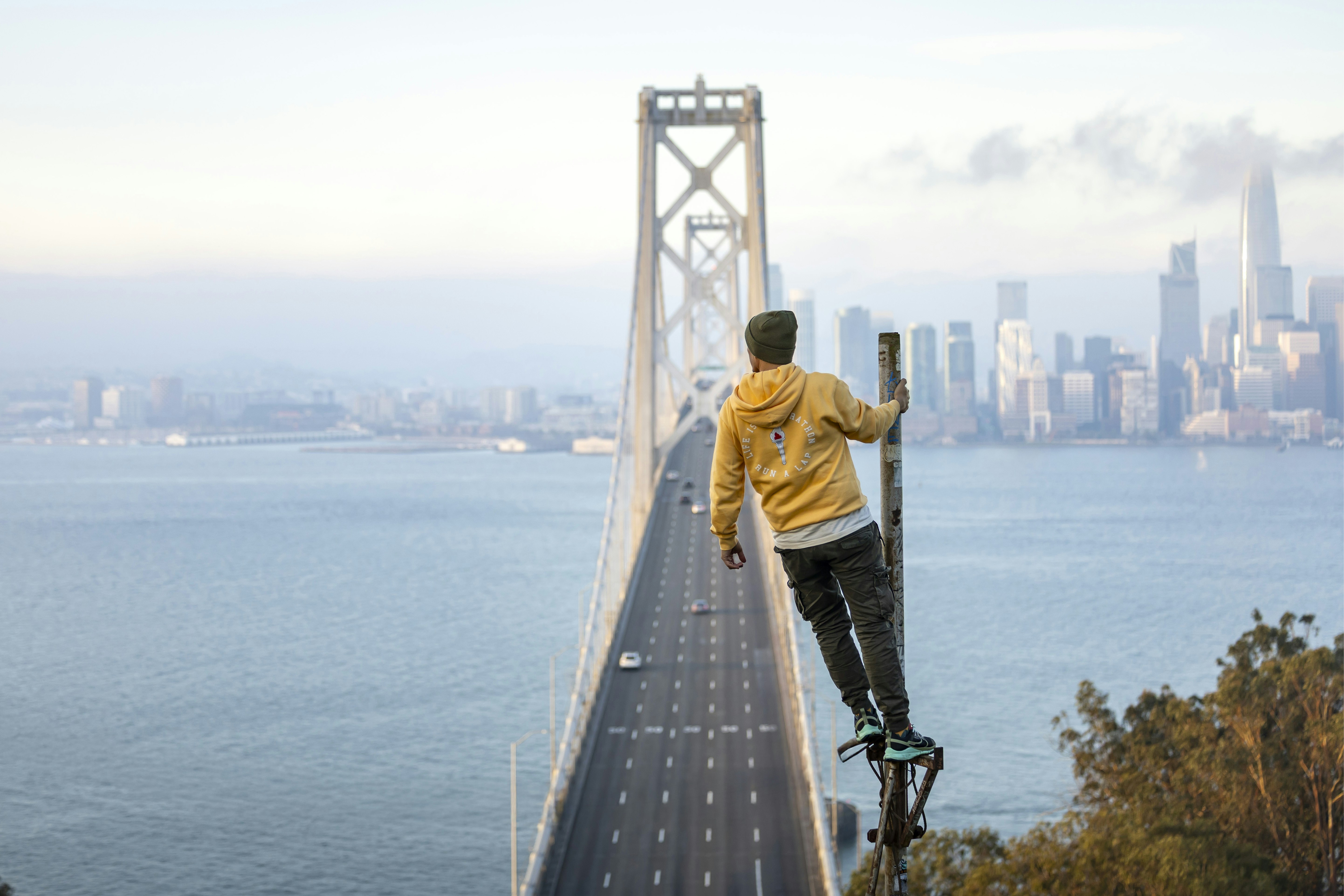 Hang Time on the Golden Gate: A Climber Basks in the City Mist