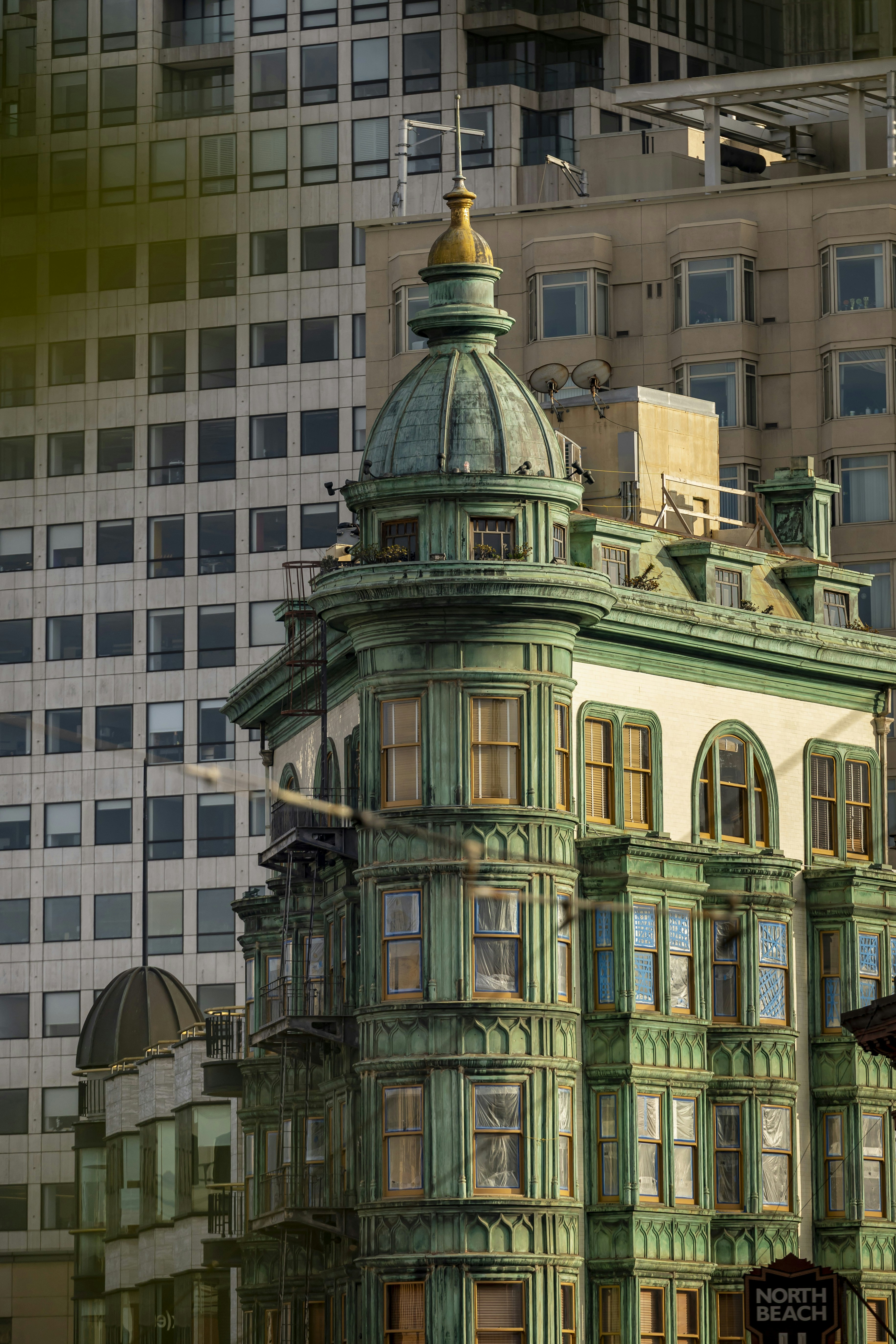 Green Domed Terrace Amid Glass Giants