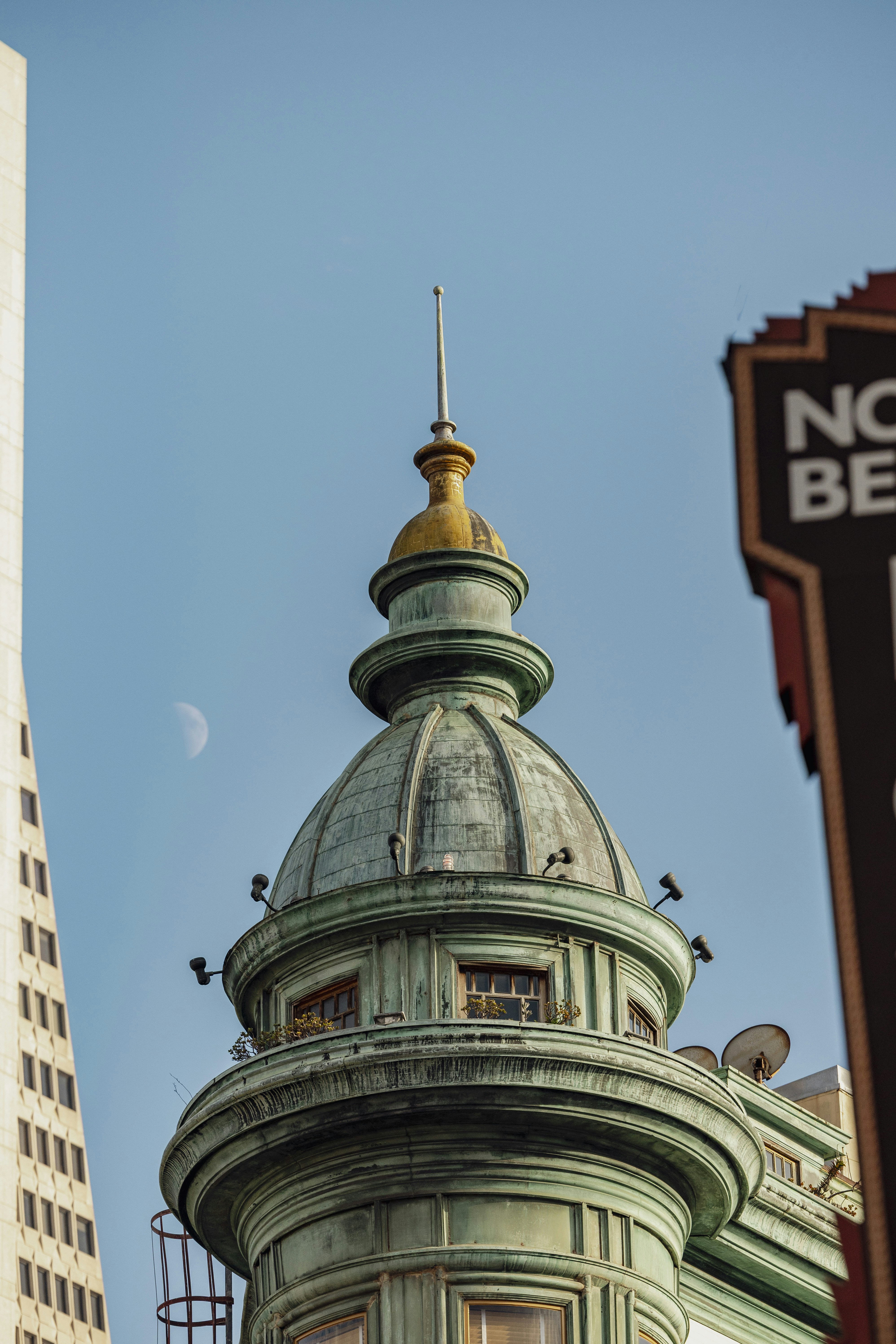 The Copper Crown: A Green Dome Against a Clear Sky