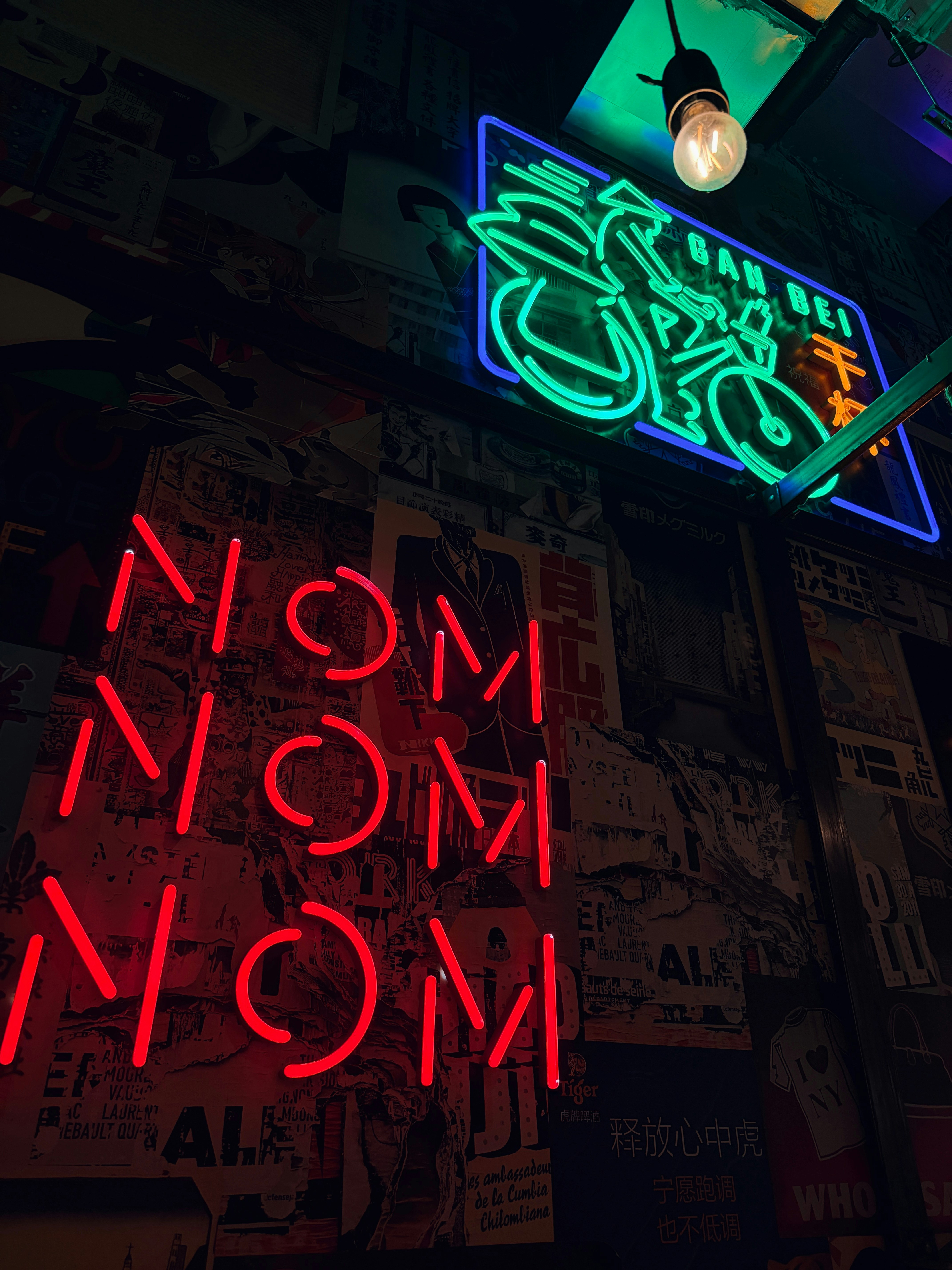 Neon Echoes: Red and Blue Signals from a Night Wall