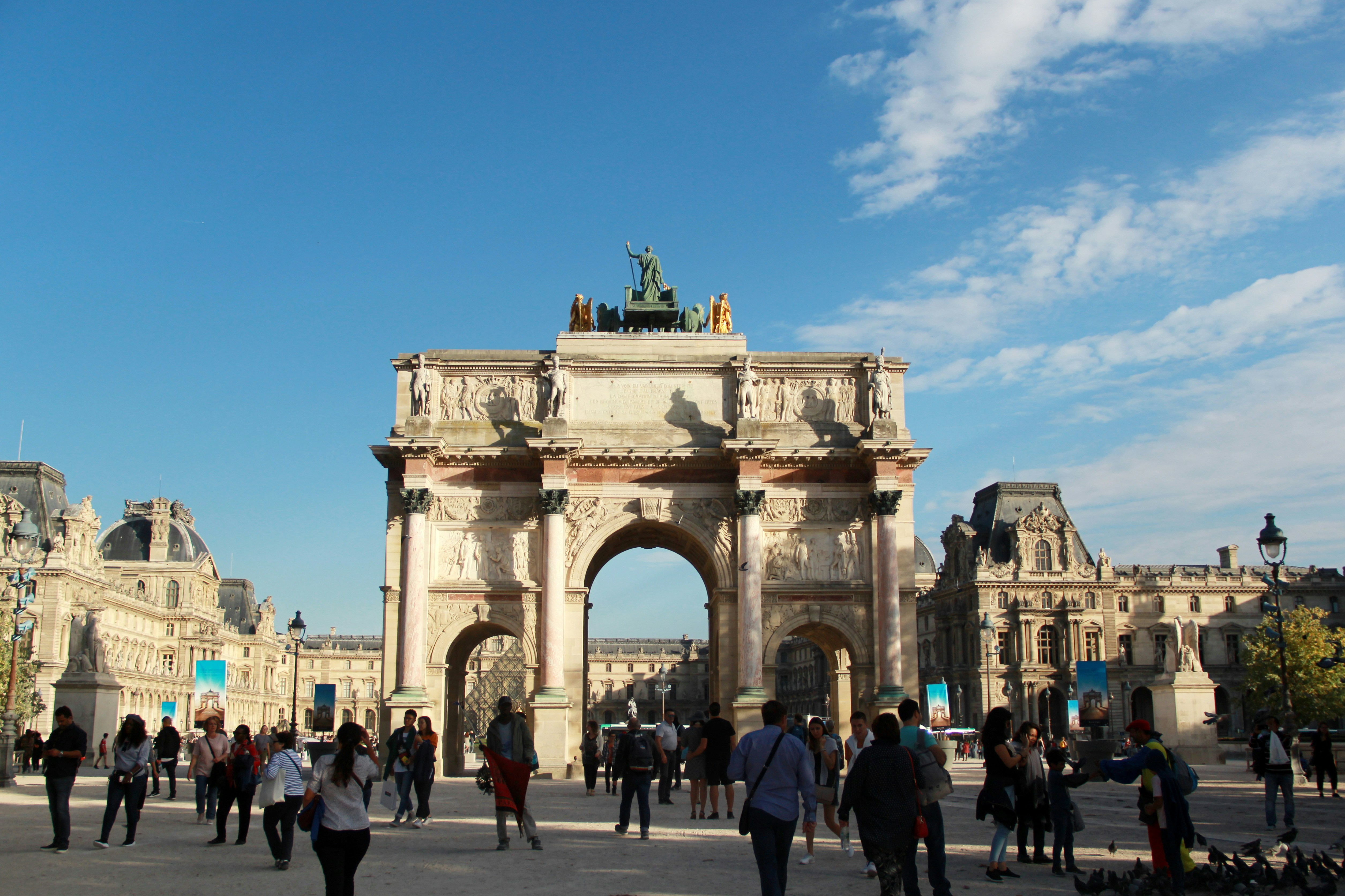 Arc de triomphe du carrousel with people walking photo – Free ...