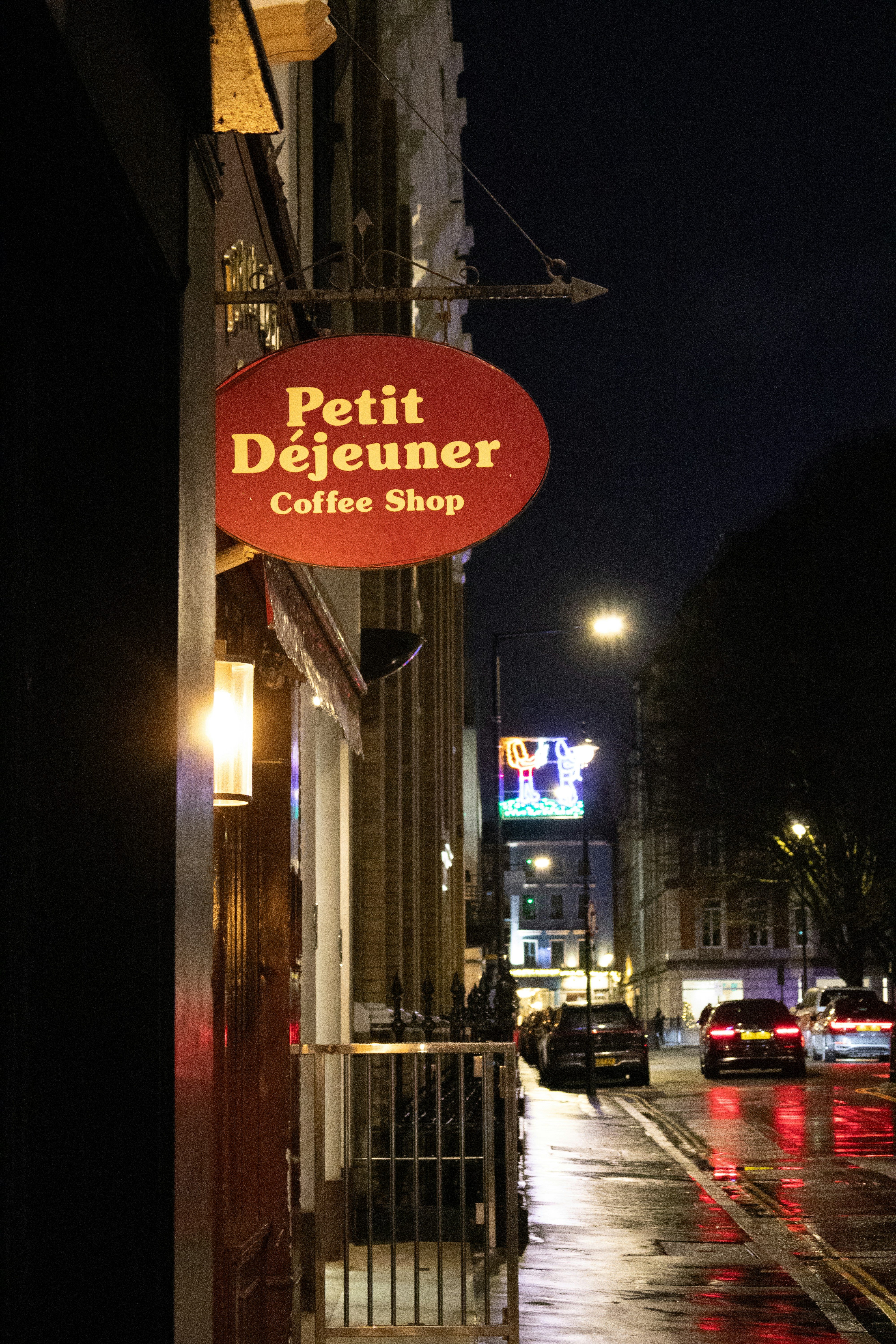 Night Walk Past the Petit Déjeuner Sign