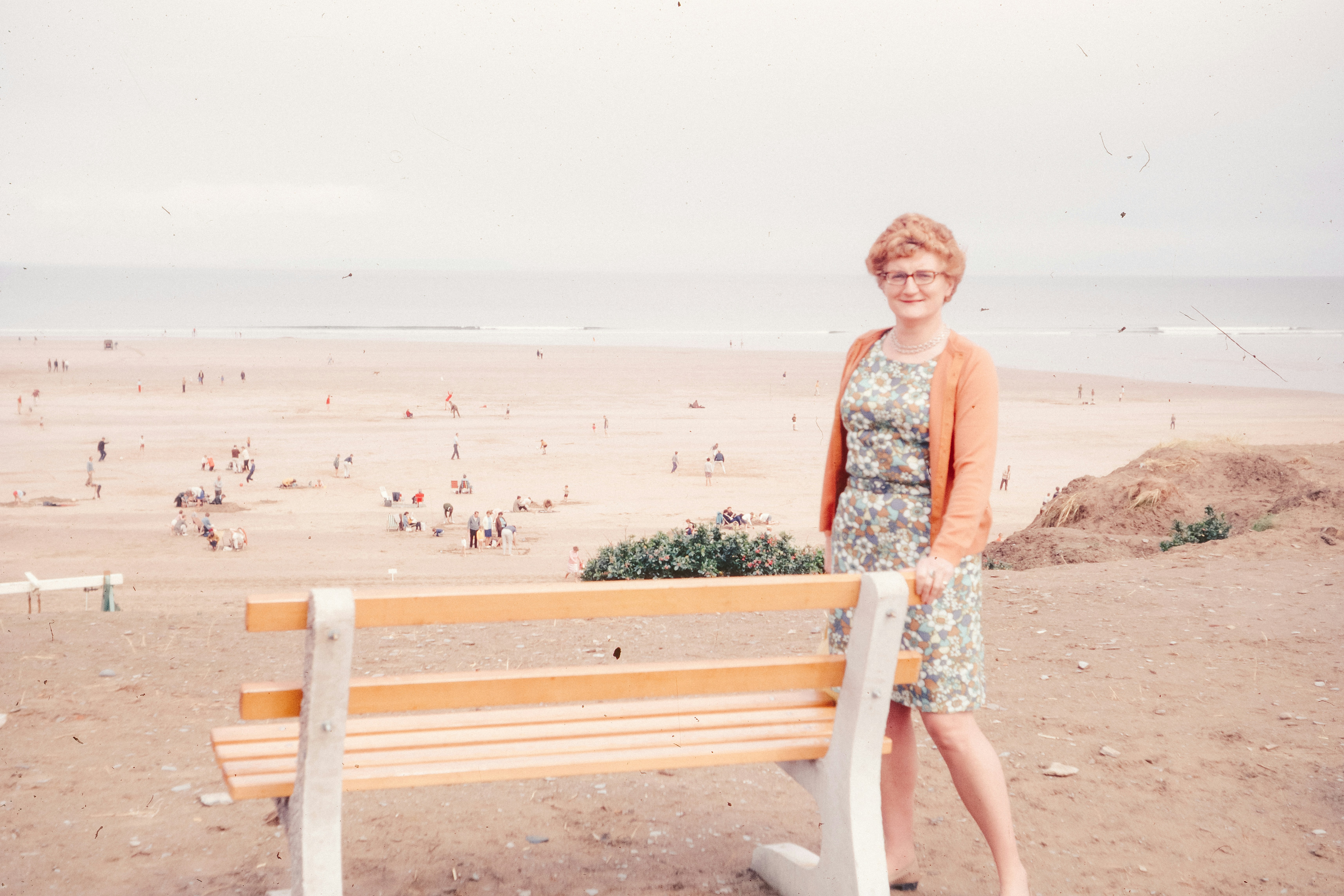 Sunlit Seaside Portrait by the Parked Bench