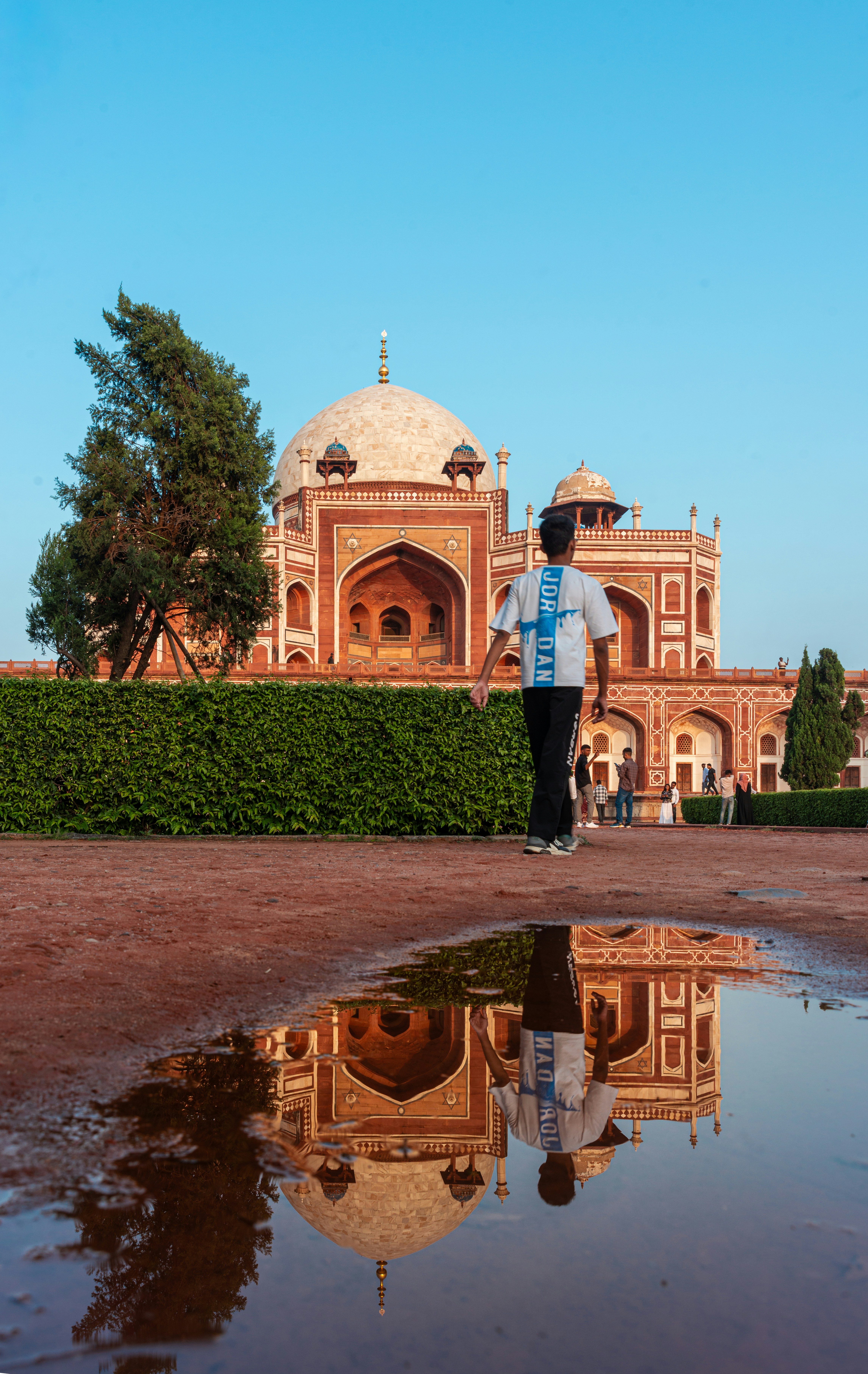 Humayun's Tomb in Delhi is a UNESCO World Heritage Site and a masterpiece of Mughal architecture, commissioned by Empress Bega Begum in 1570. It was the first garden-mausoleum of the subcontinent and is famous for its Persian-style charbagh (four-part garden) and octagonal, red sandstone structure, which inspired later Mughal monuments like the Taj Mahal.
