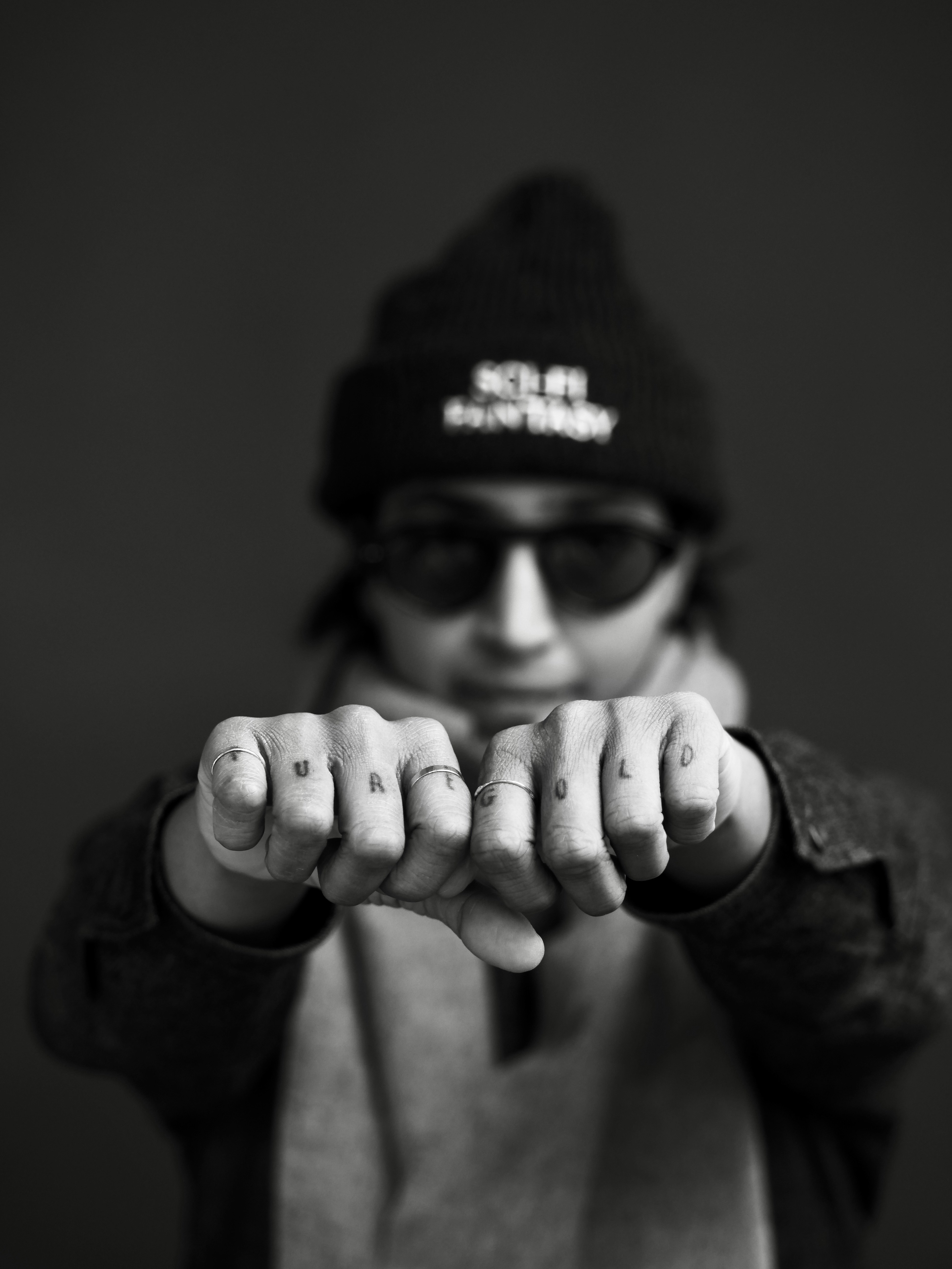 Fistful of Focus: The Tattooed Message in a Soft Blur