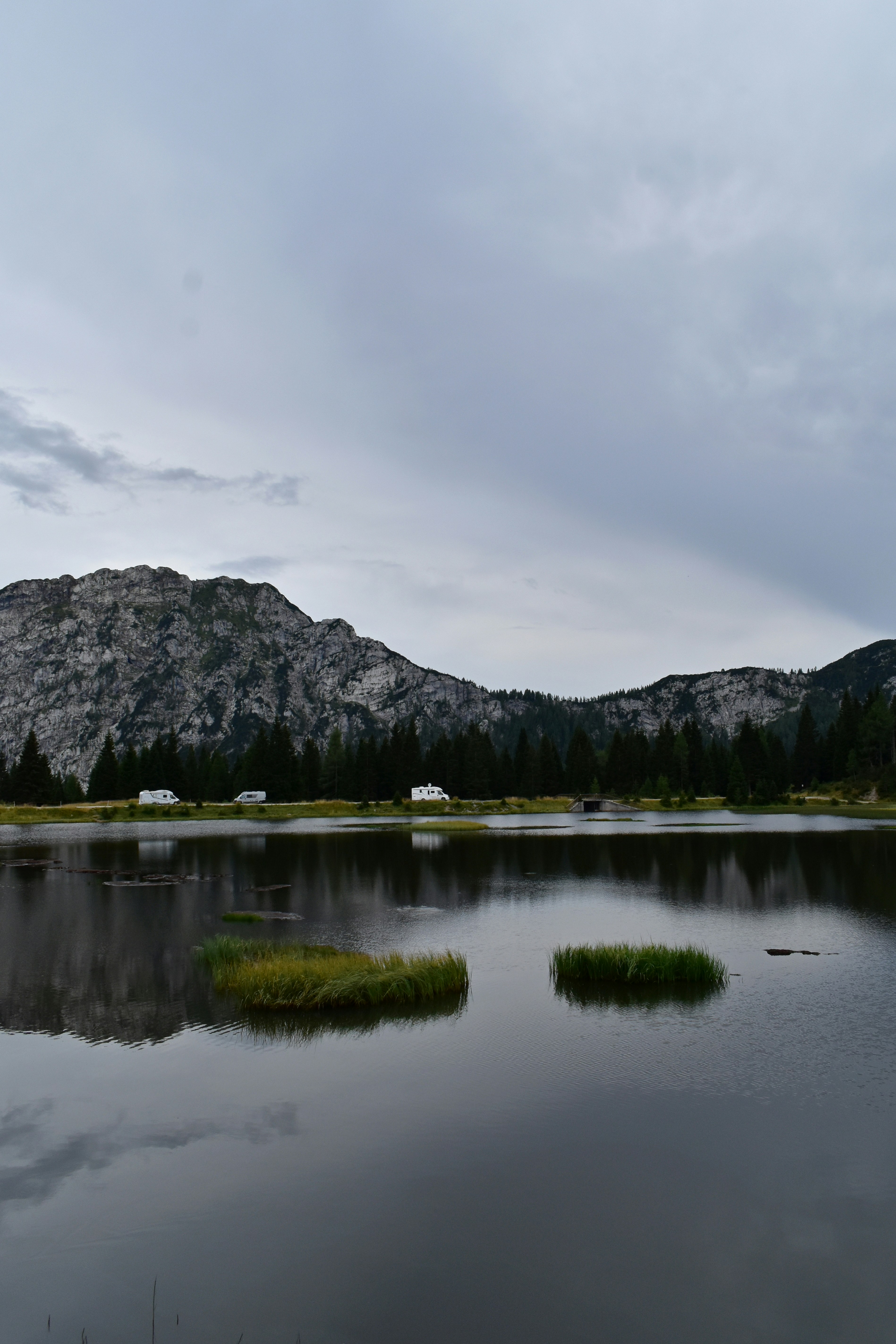 Calm Lake Under a Gloomy Crest