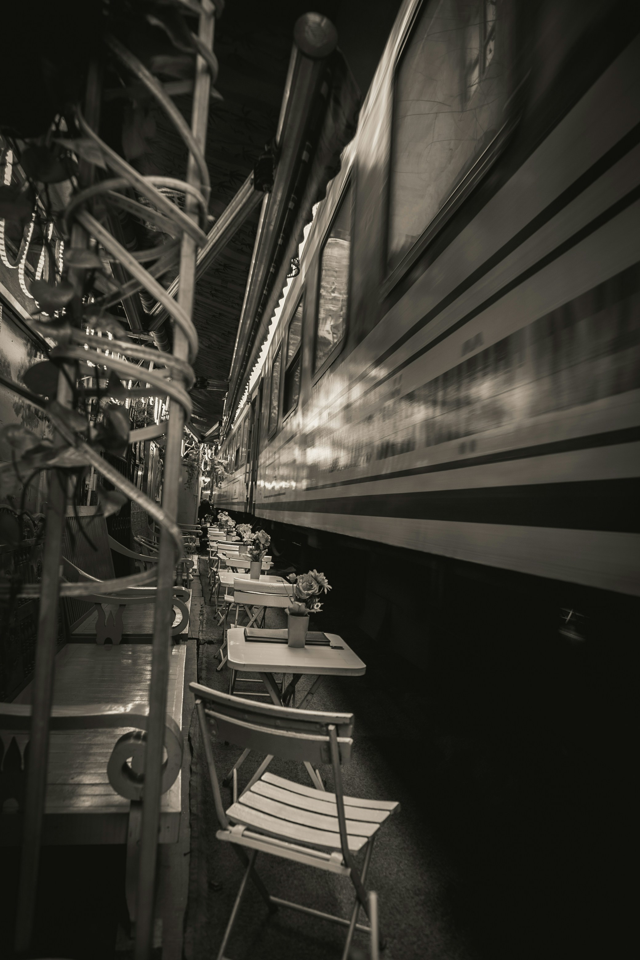 Steamline Bistro at Dusk: A Slow Blur Along the Platform