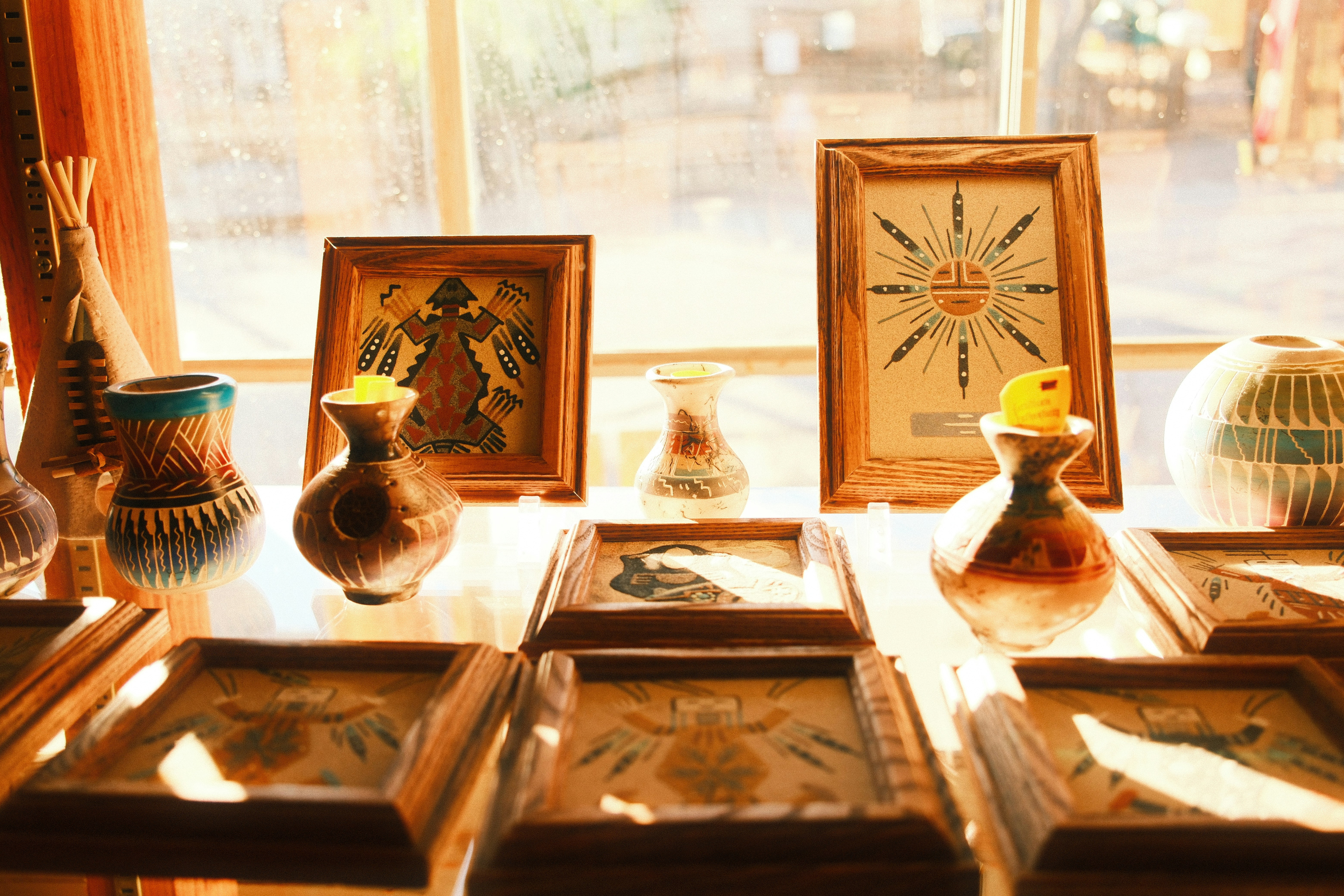 Sunlit Stillness: Framed Craft and Clay in a Warm Window