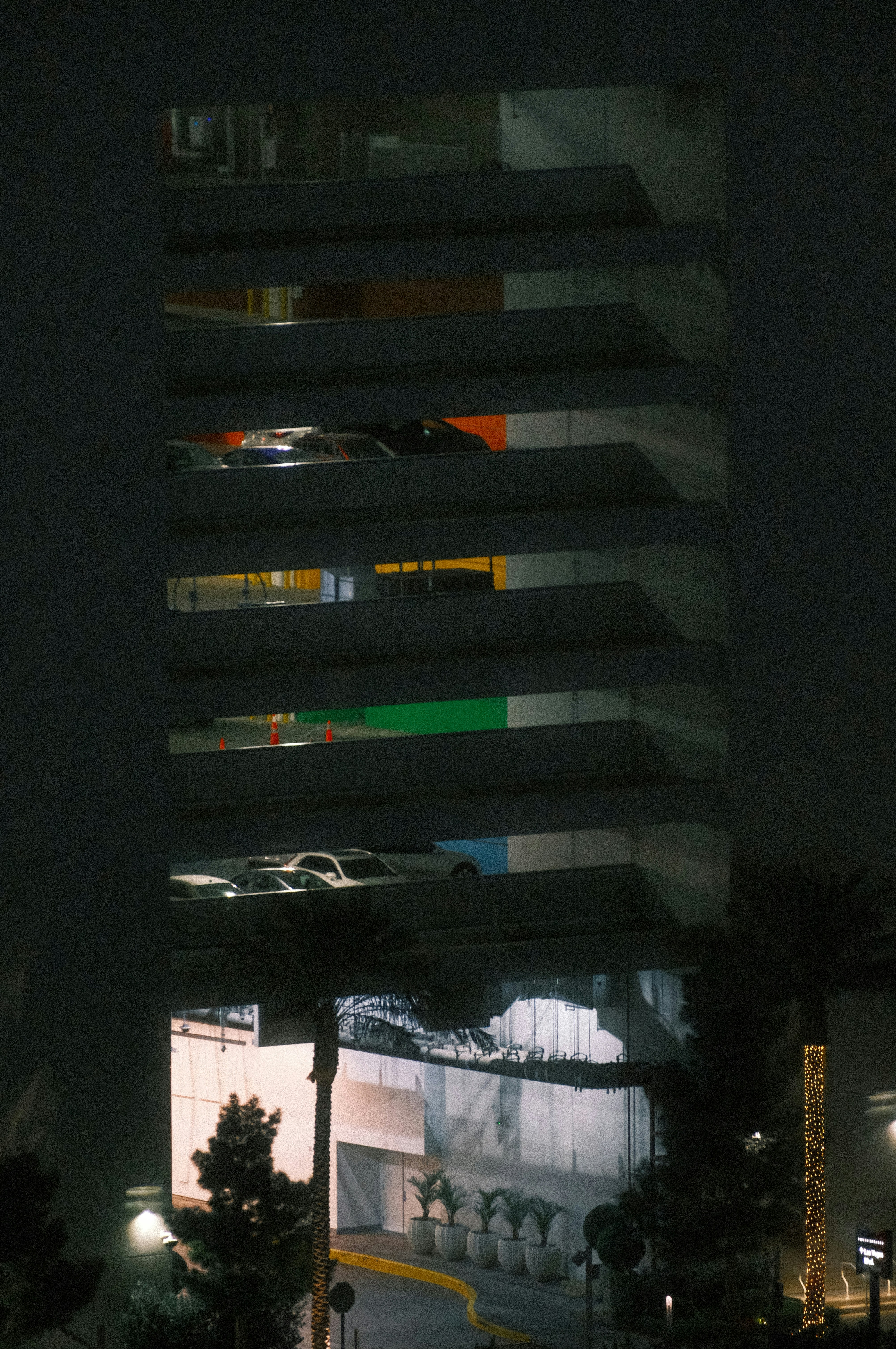 Hidden Garage Levels: Nighttime Parking Through Slatted Veils
