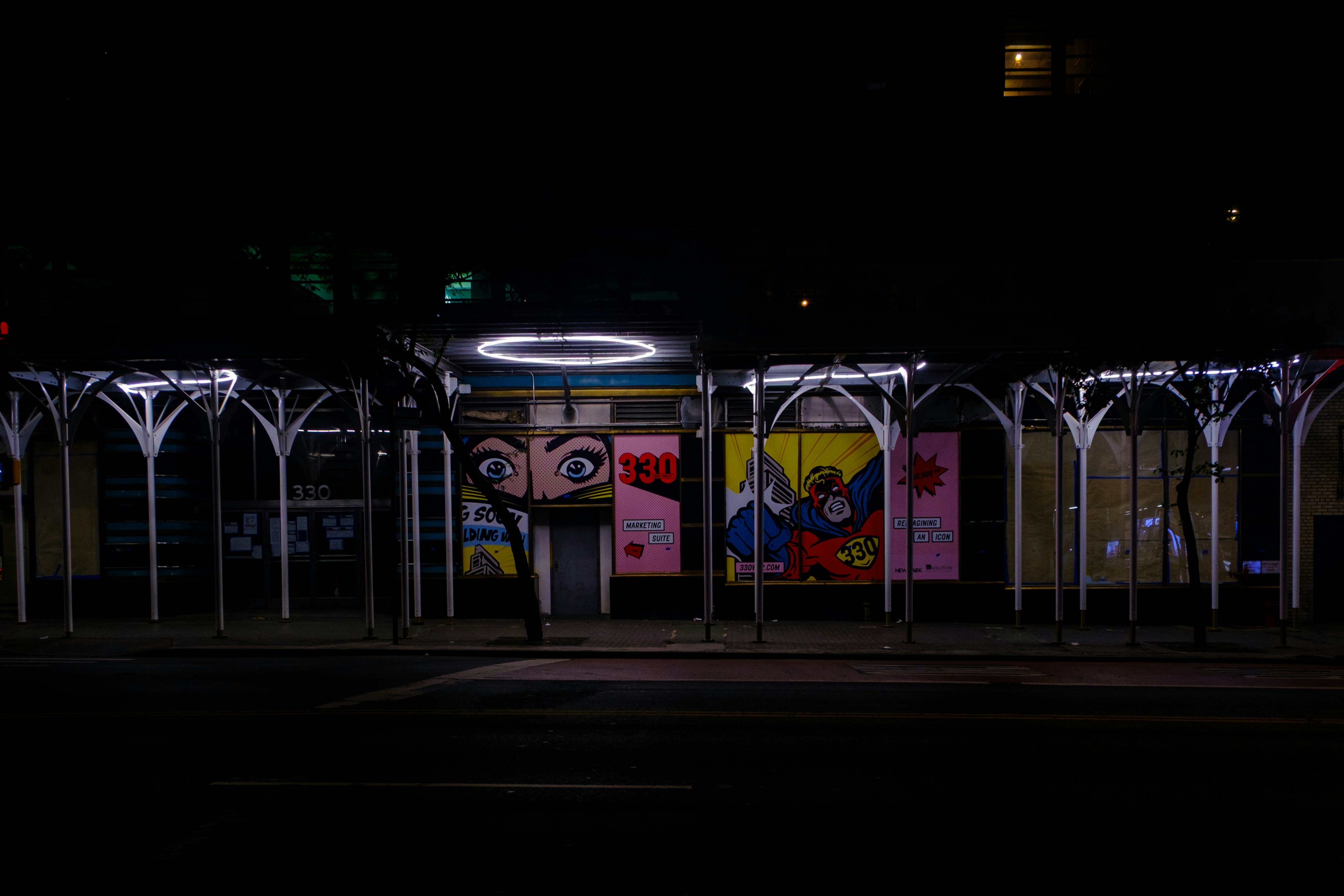 Neon Carousel of City Portraits under a Halo