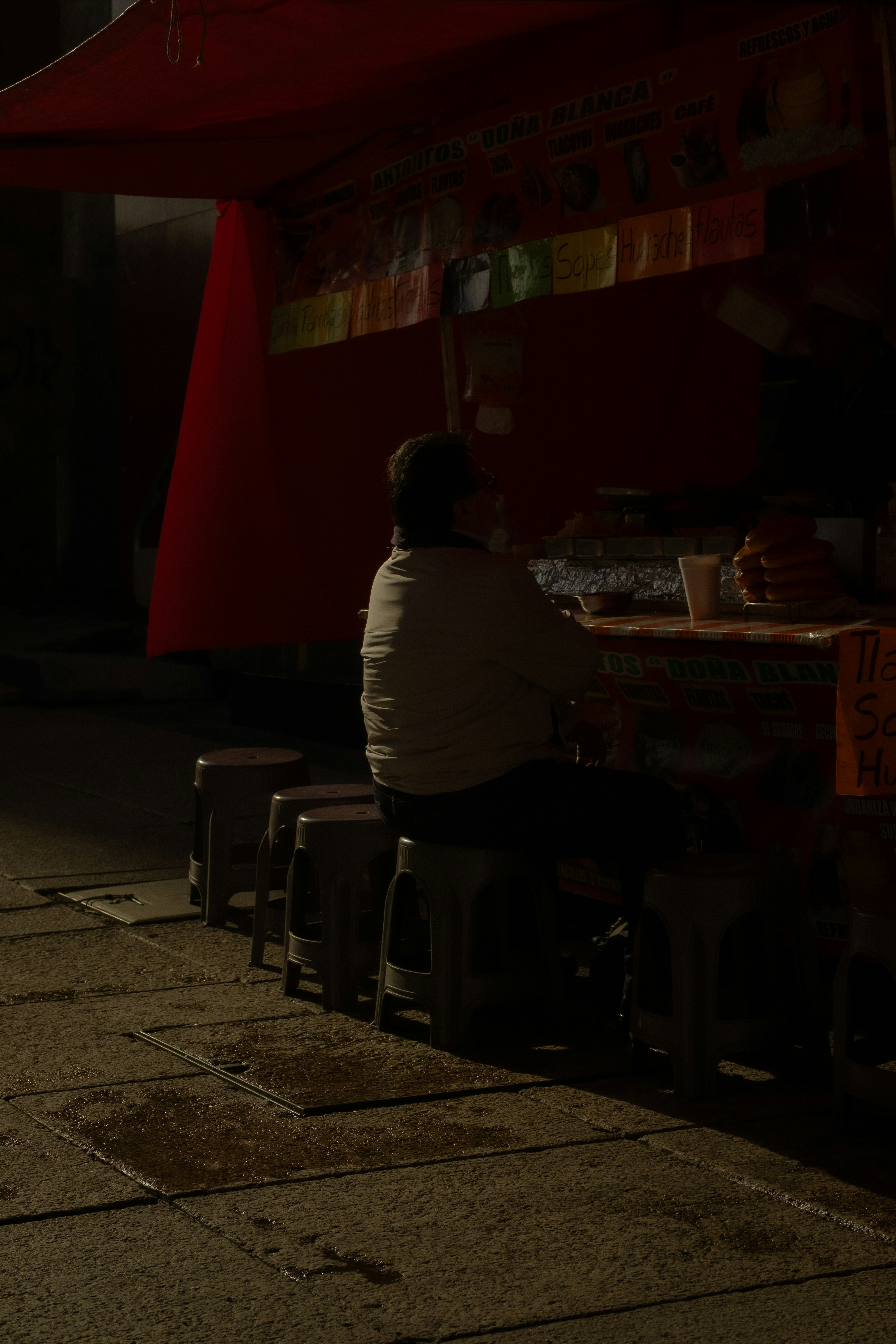 Lonely Snack Stall: A Dimly Lit Moment on the Street