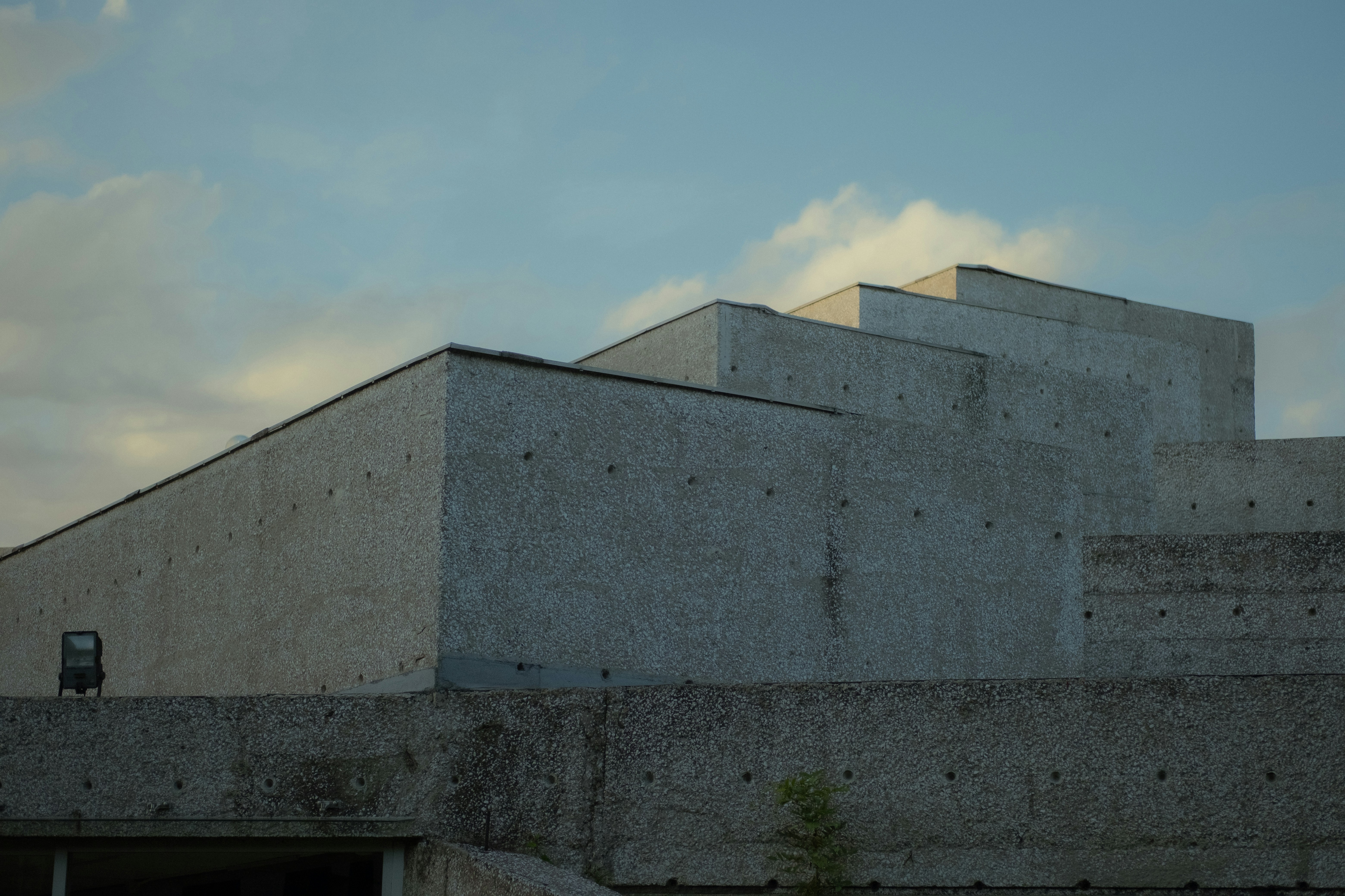 Modern concrete building with stepped roofline photo – Free ...