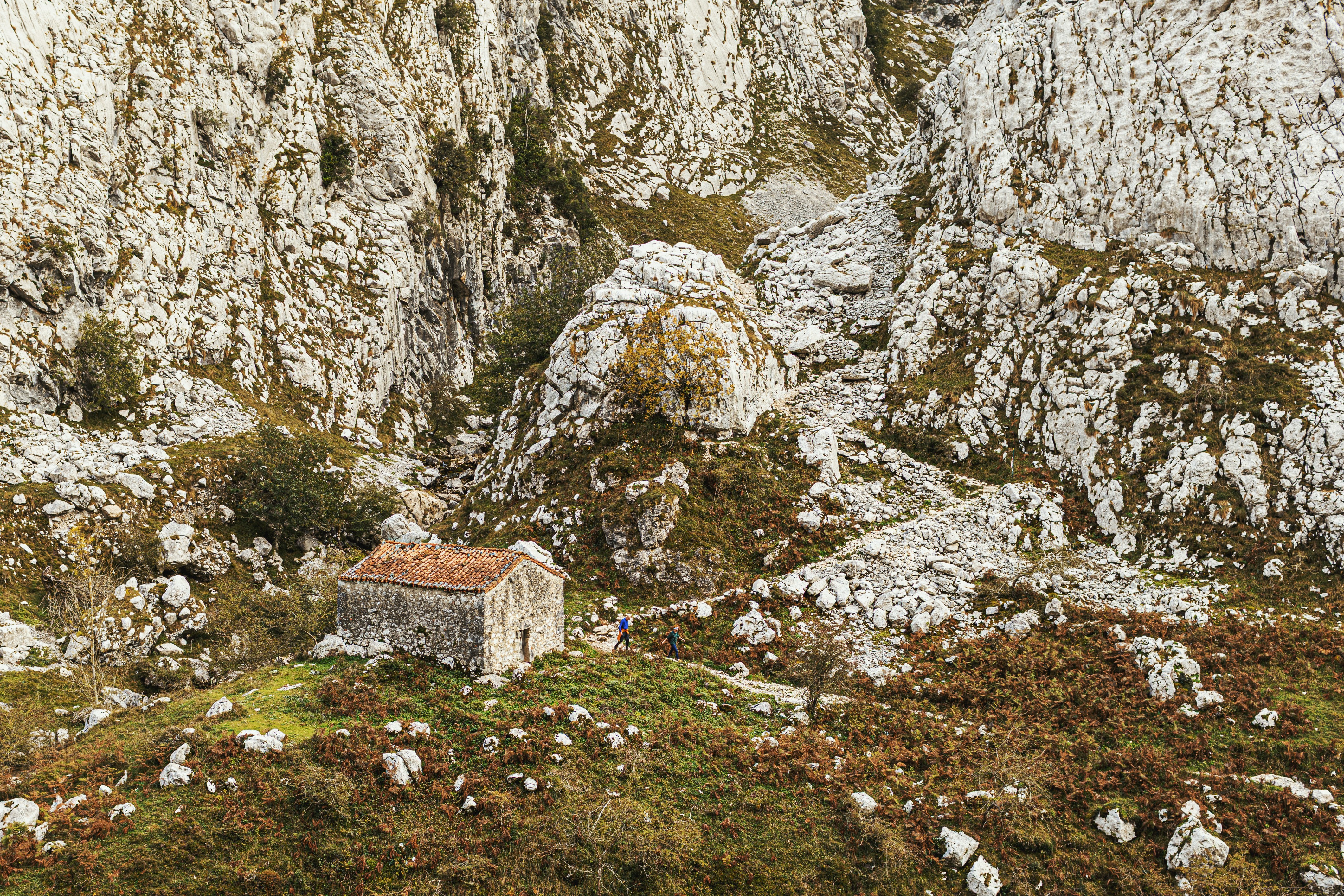 Sheltered Stone Cabin Amid Rugged Limestone