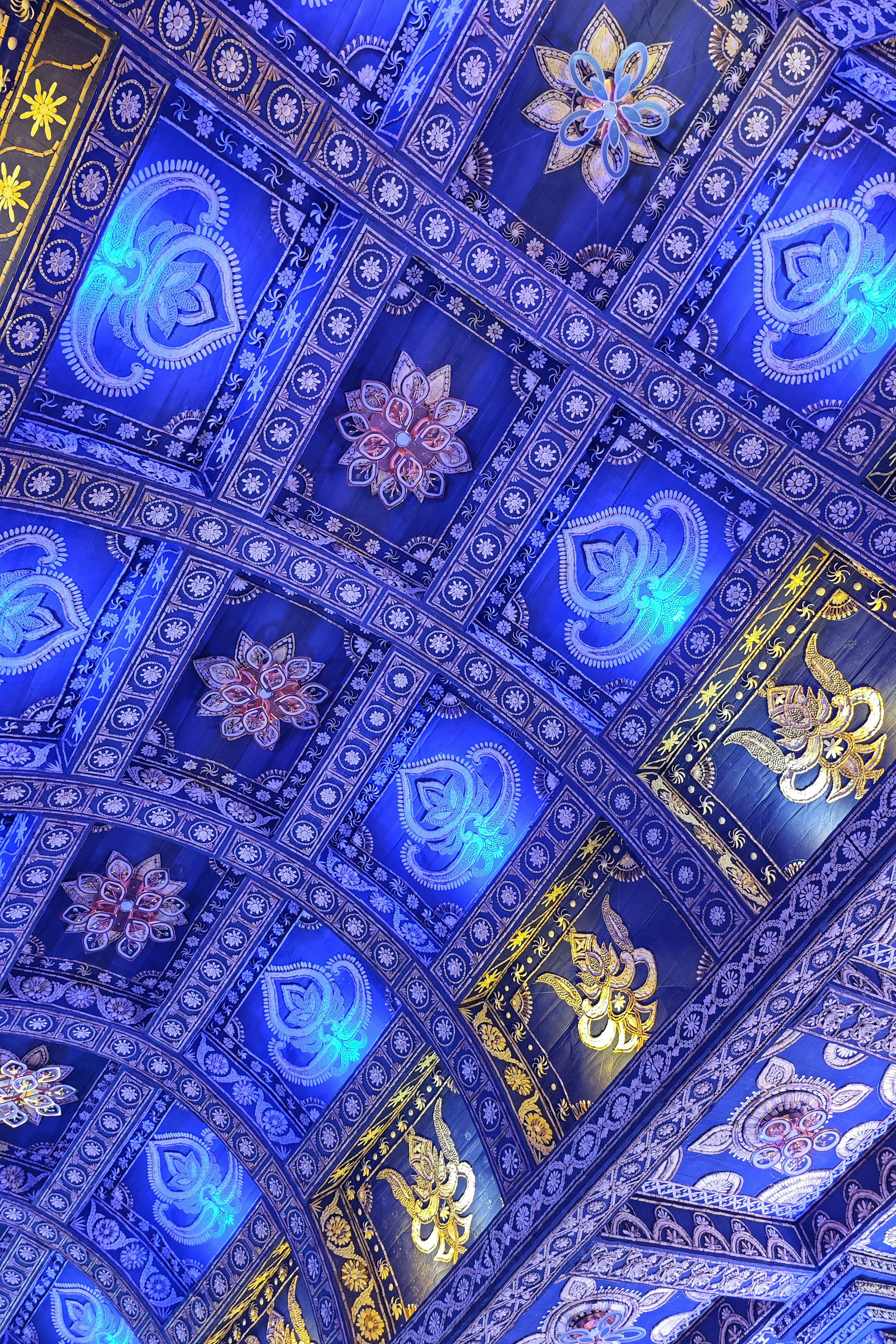 Blue Sacred Vaults: A Ceiling of Intricate Geometric Friezes and Lotus Motifs