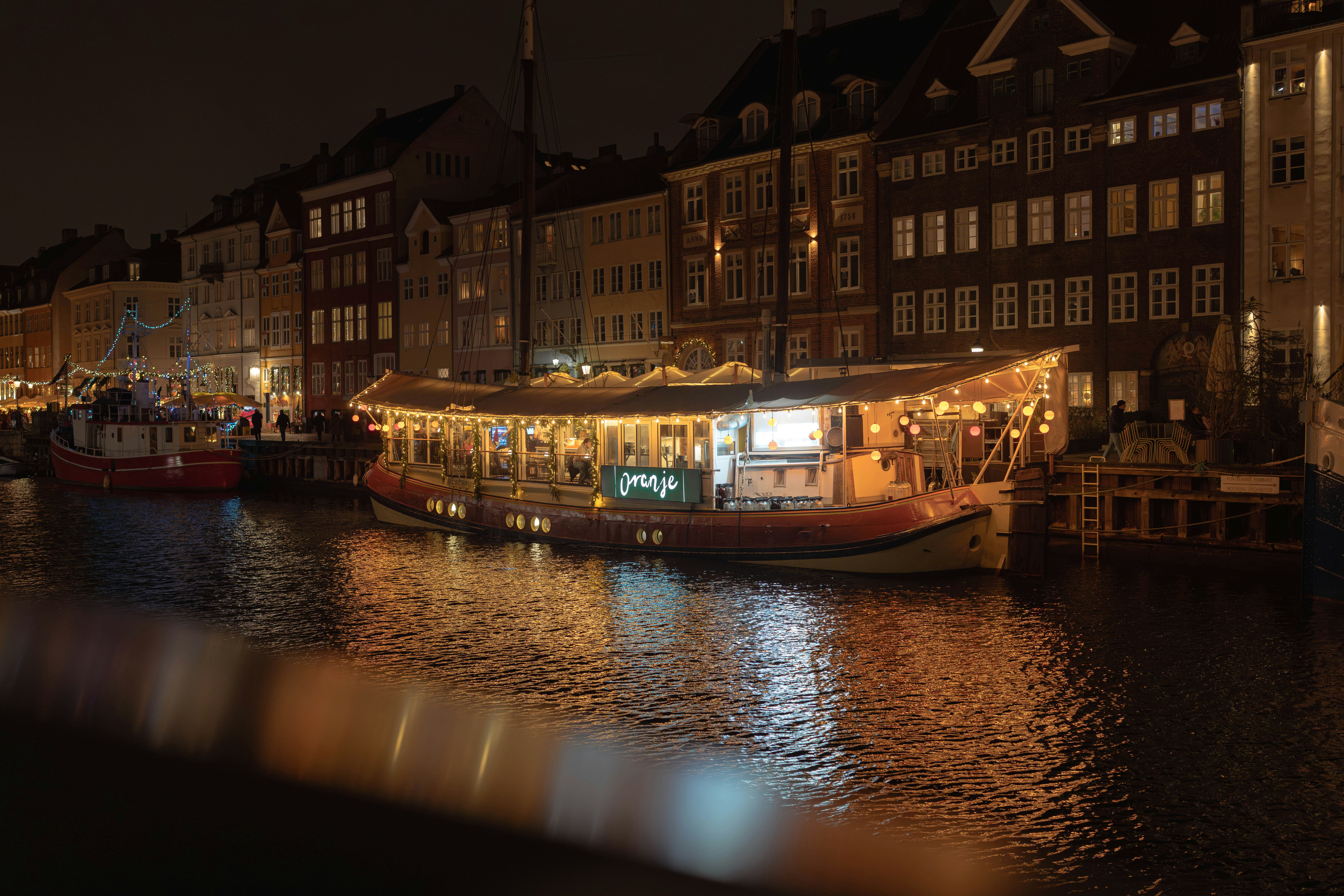 Nighttime Harbor Market Lights on a German Waterfront