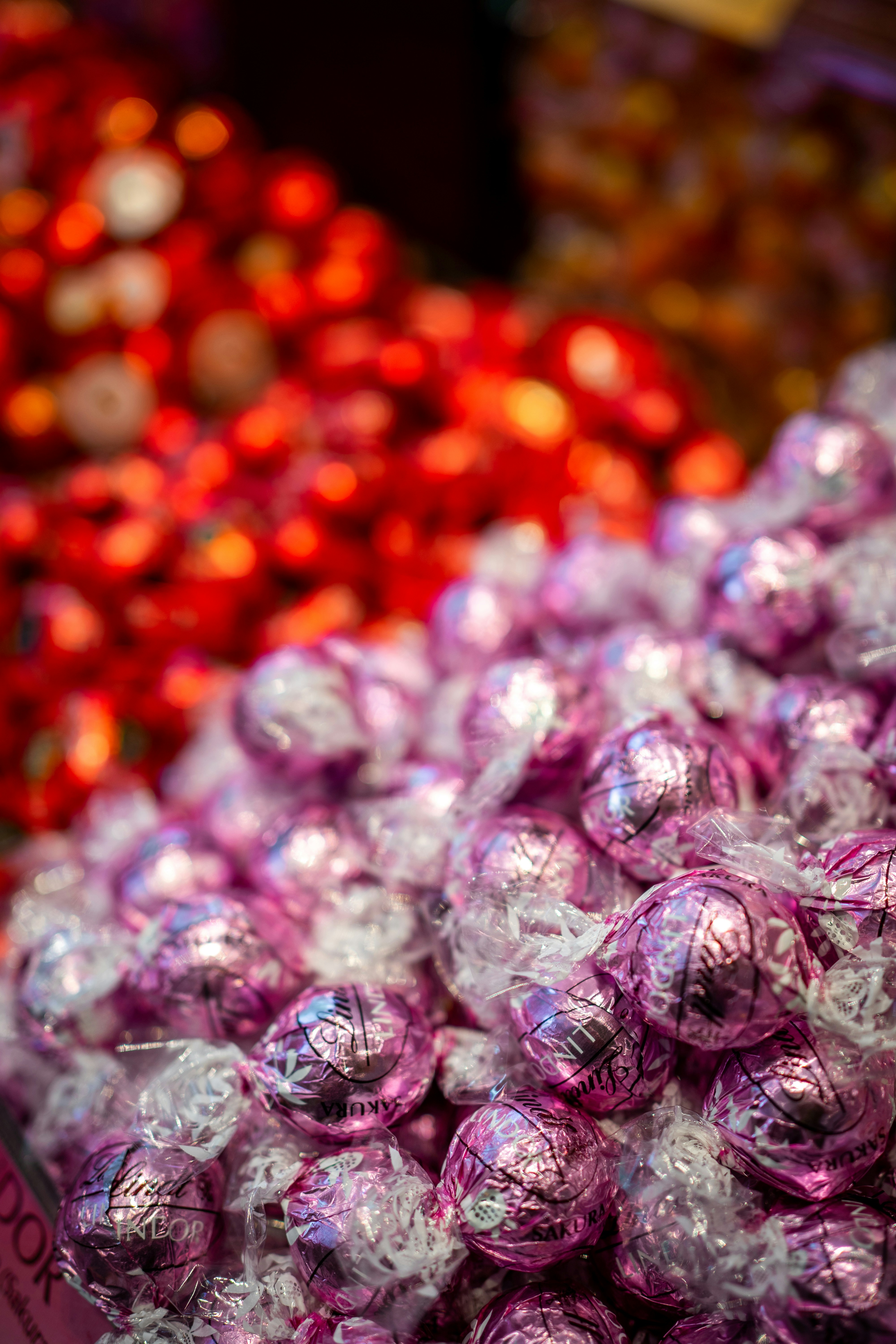 Pile of pink and red wrapped candiesJakub Tomasik