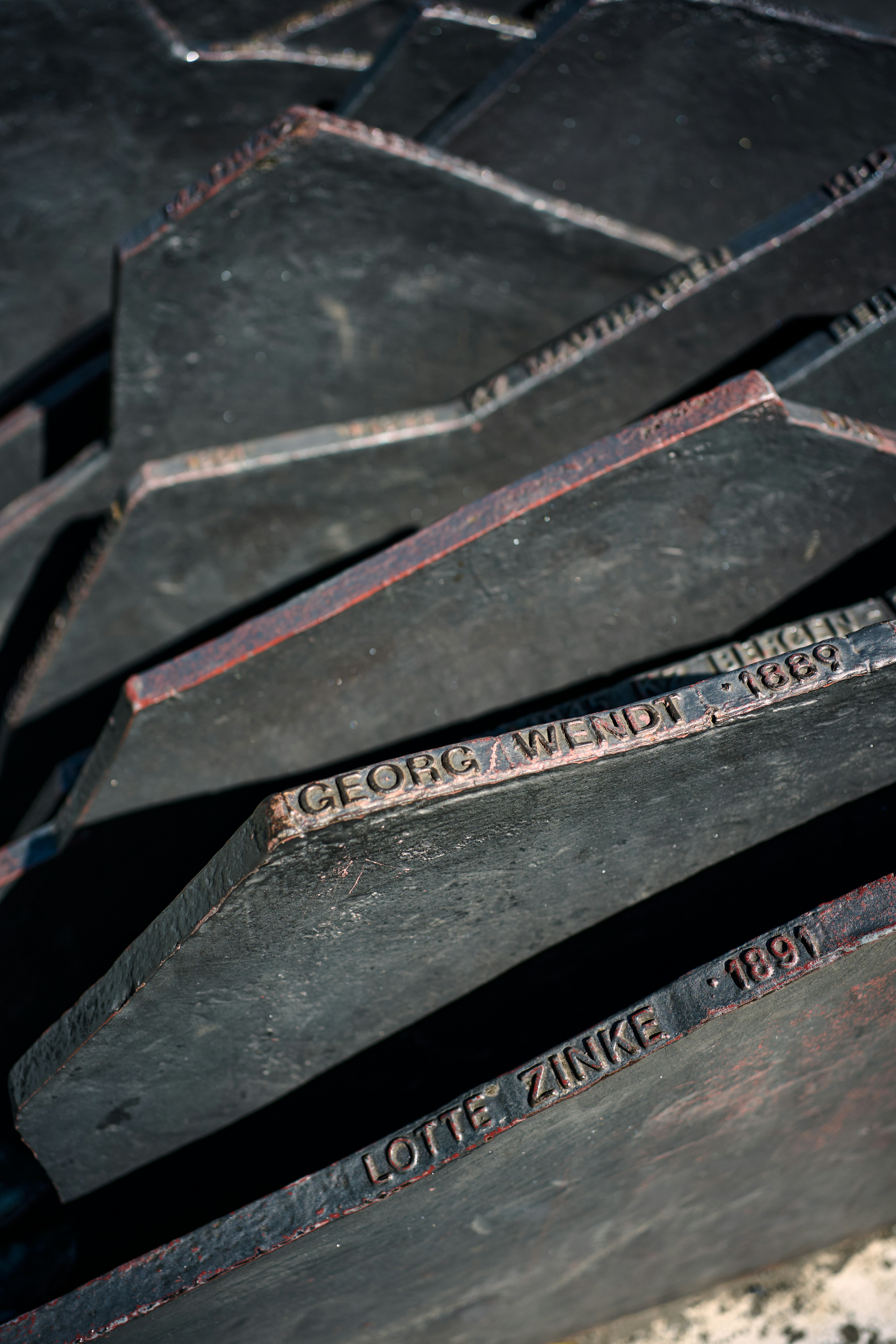 Ironweights Embedded with Inscriptions: A Quiet Tangle of History