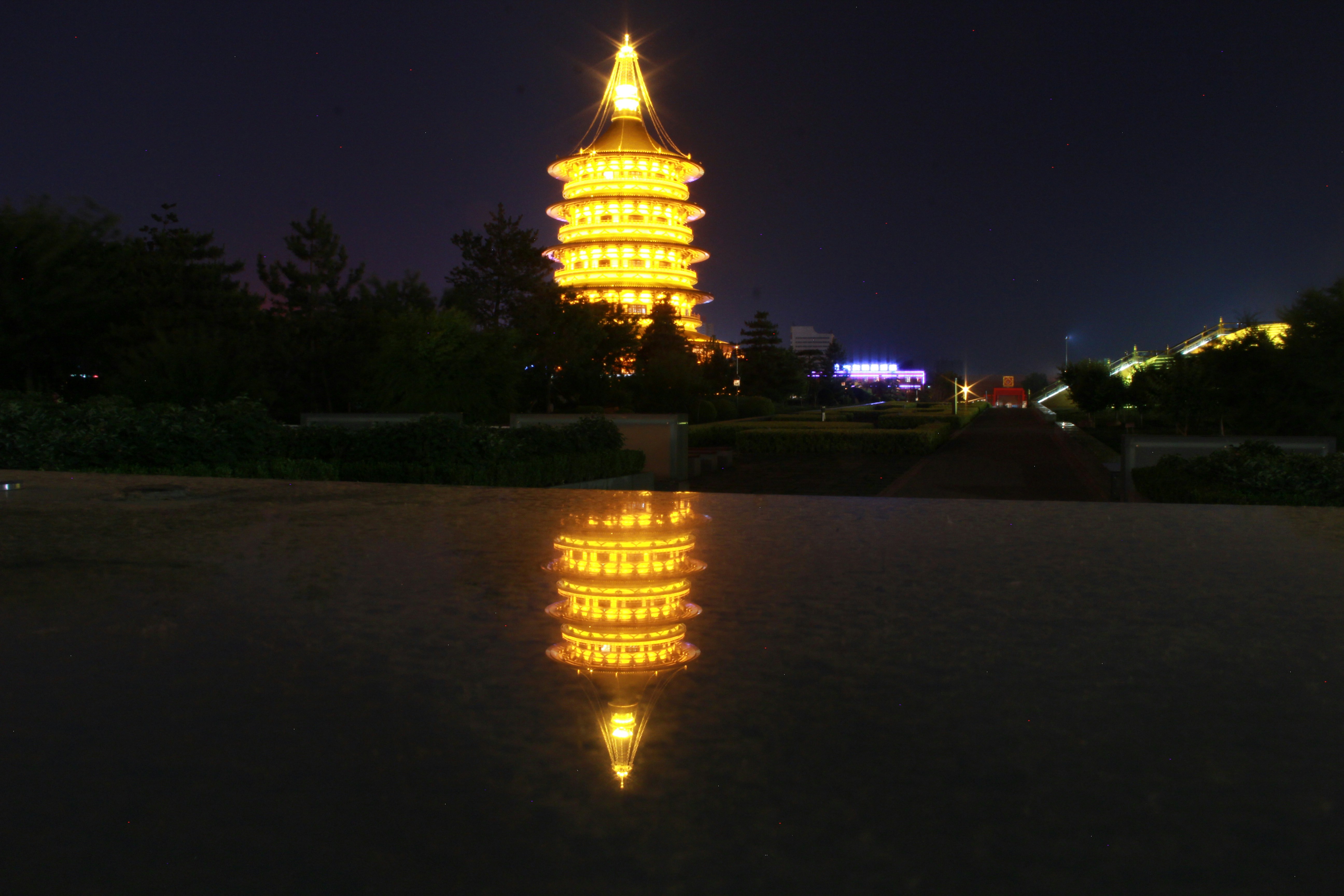 Golden Pagoda at Night: Reflections in a Quiet Pool