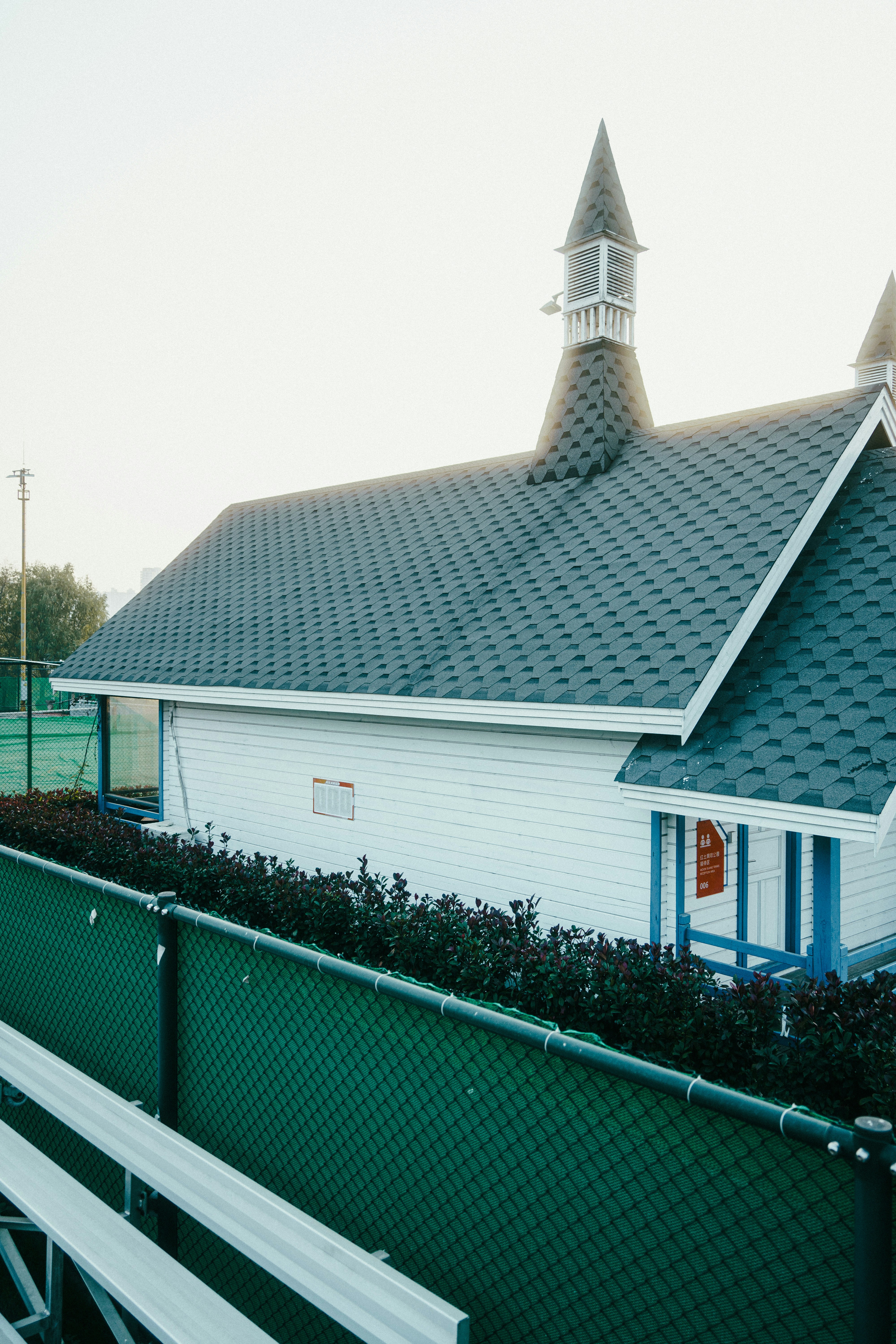 Chapel Roof Lines: A Quiet Perspective over a White-Washed Exterior