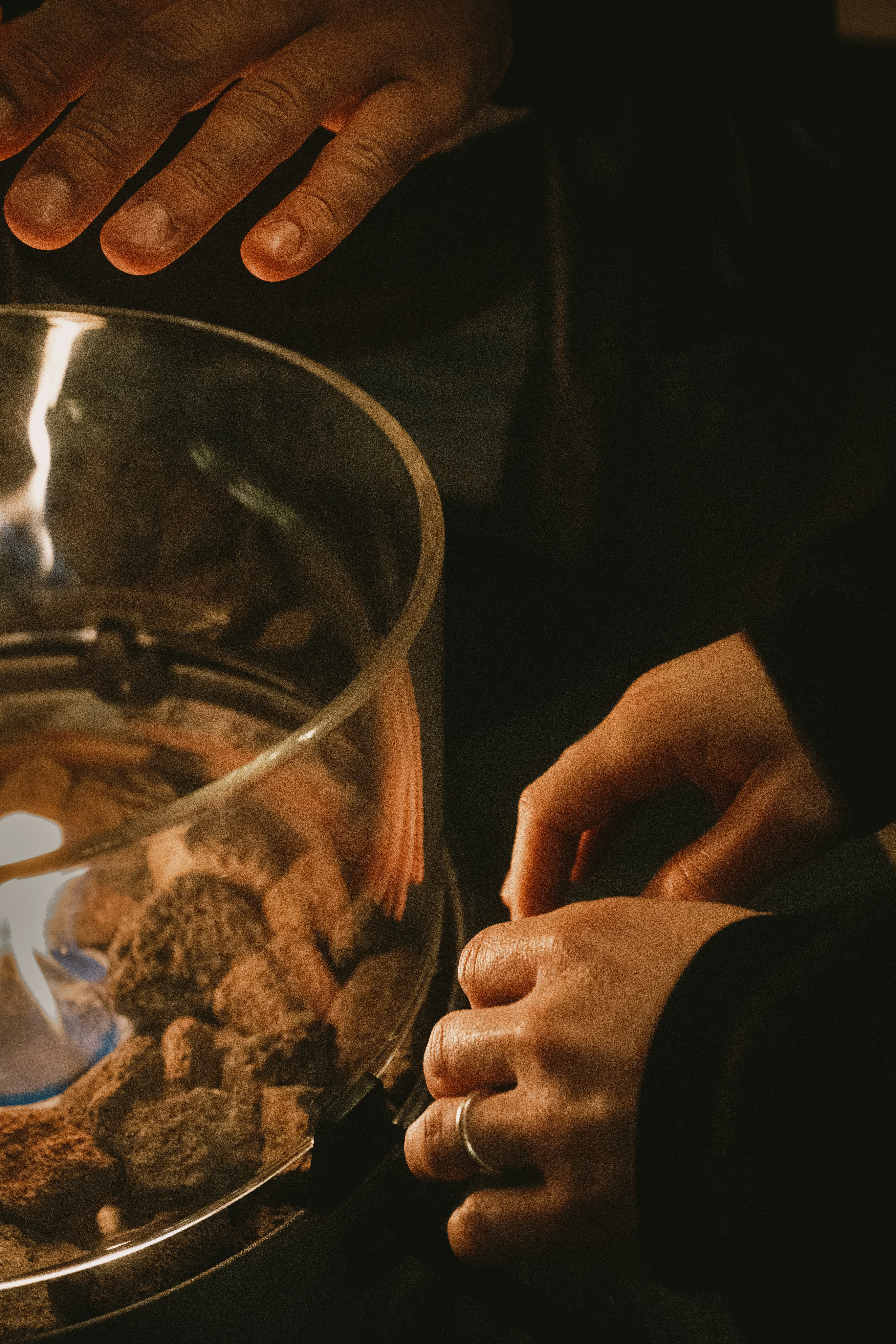 Hands at a Candle: Crafting Light and Focus